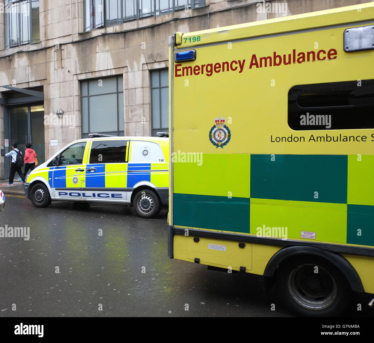 Yellow British ambulance at Paddington station in London. June 21st ...