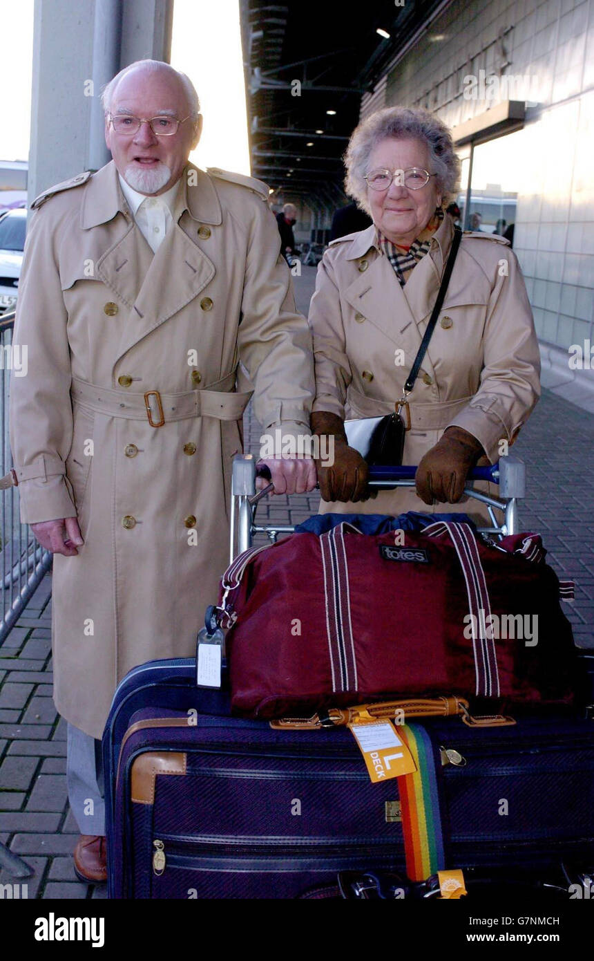 Passengers Phyllis and Jim Moncrieff from Perth, Scotland walk from the ...
