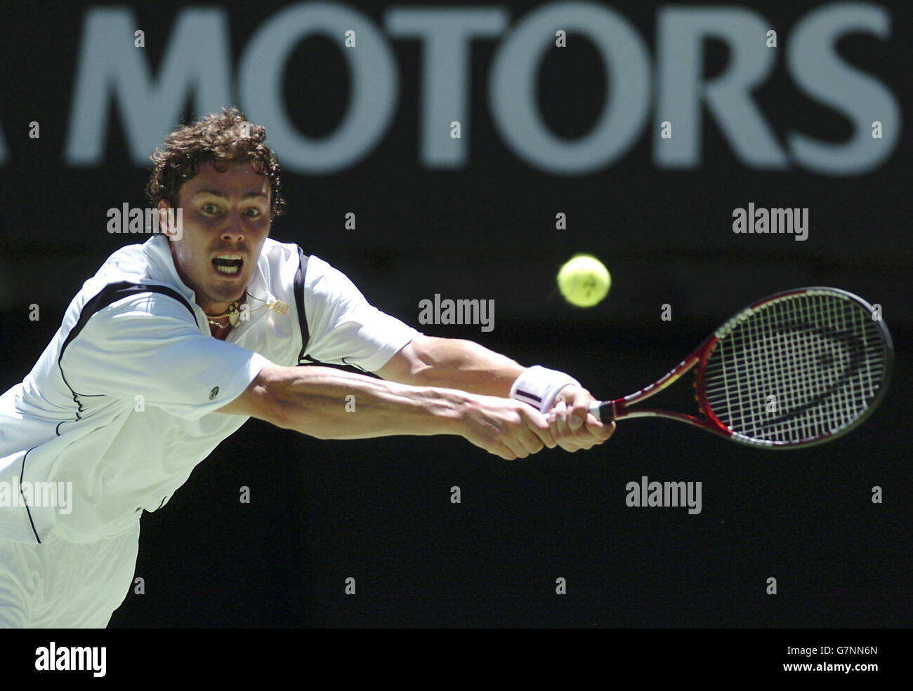 Tennis - Australian Open - Men's Third Round. Marat Safin lunges for ...