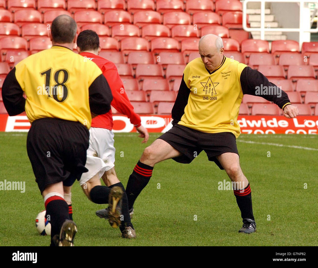 Full length kicking politics action hi-res stock photography and images ...