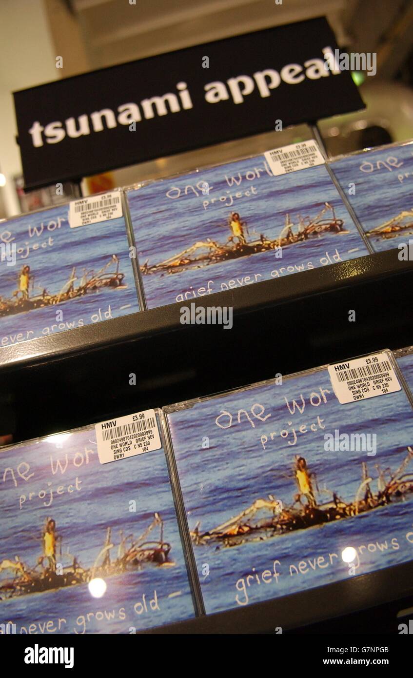 'One World Grief' single launch. Copies of the CD Stock Photo - Alamy