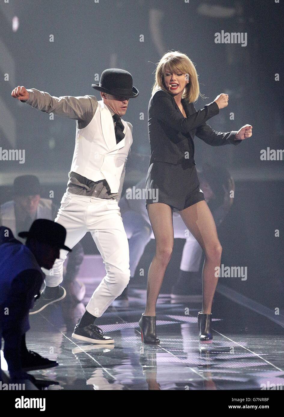 Taylor Swift performs on stage during the 2015 Brit Awards at the O2 ...