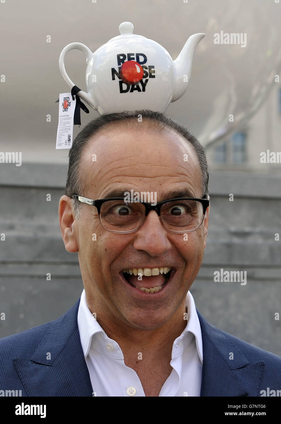 Dragons' Den star Theo Paphitis balances a Comic Relief teapot on his ...