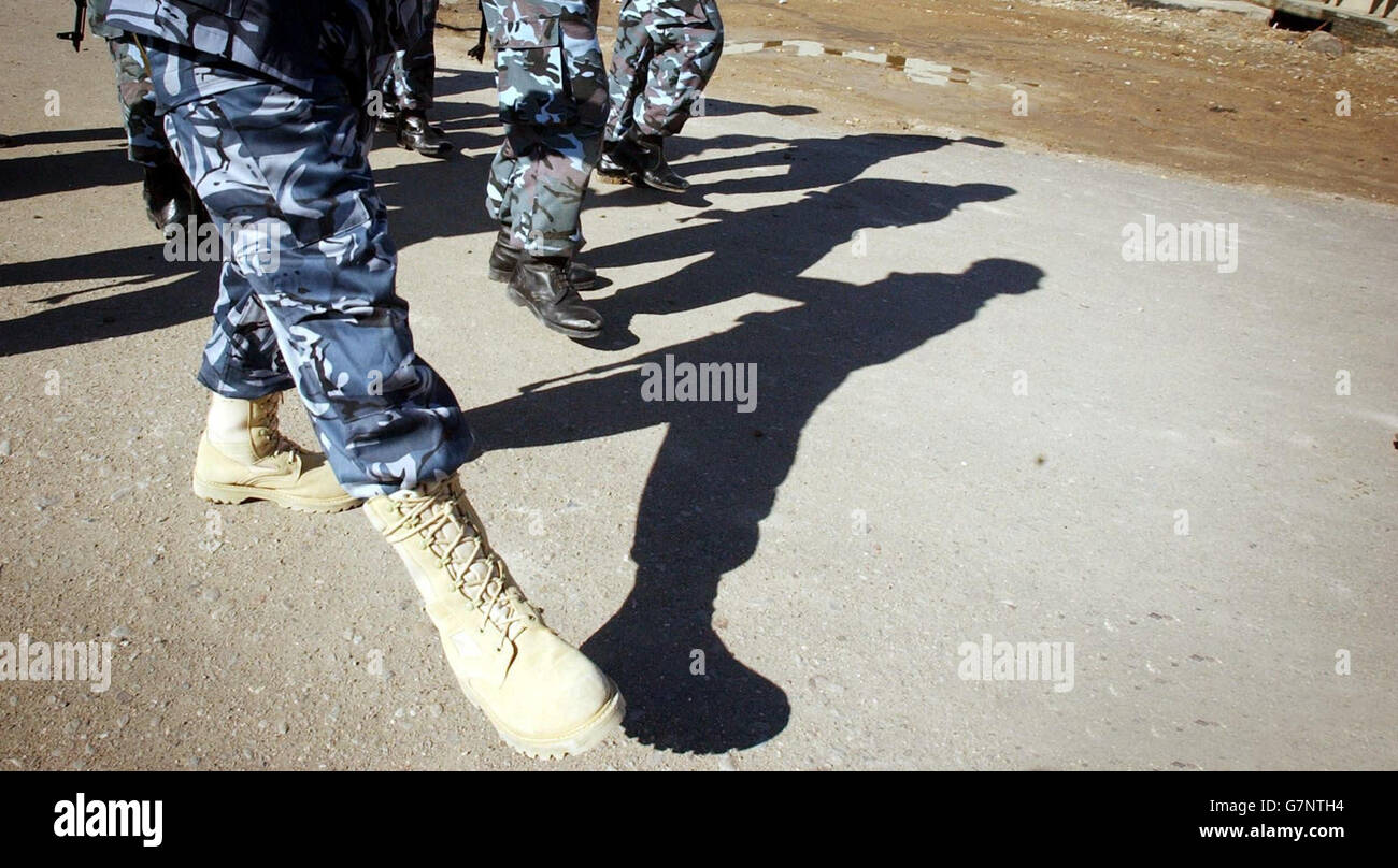 Members of the Iraqi police's Tactical Support Unit (TSU) carry out a ...