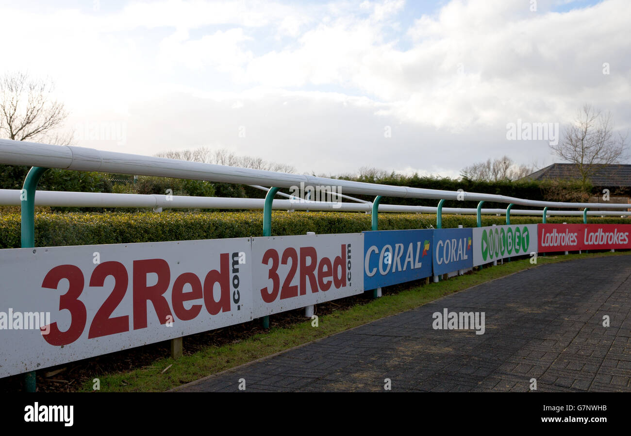 A general view of betting signage around the parade ring Stock Photo ...