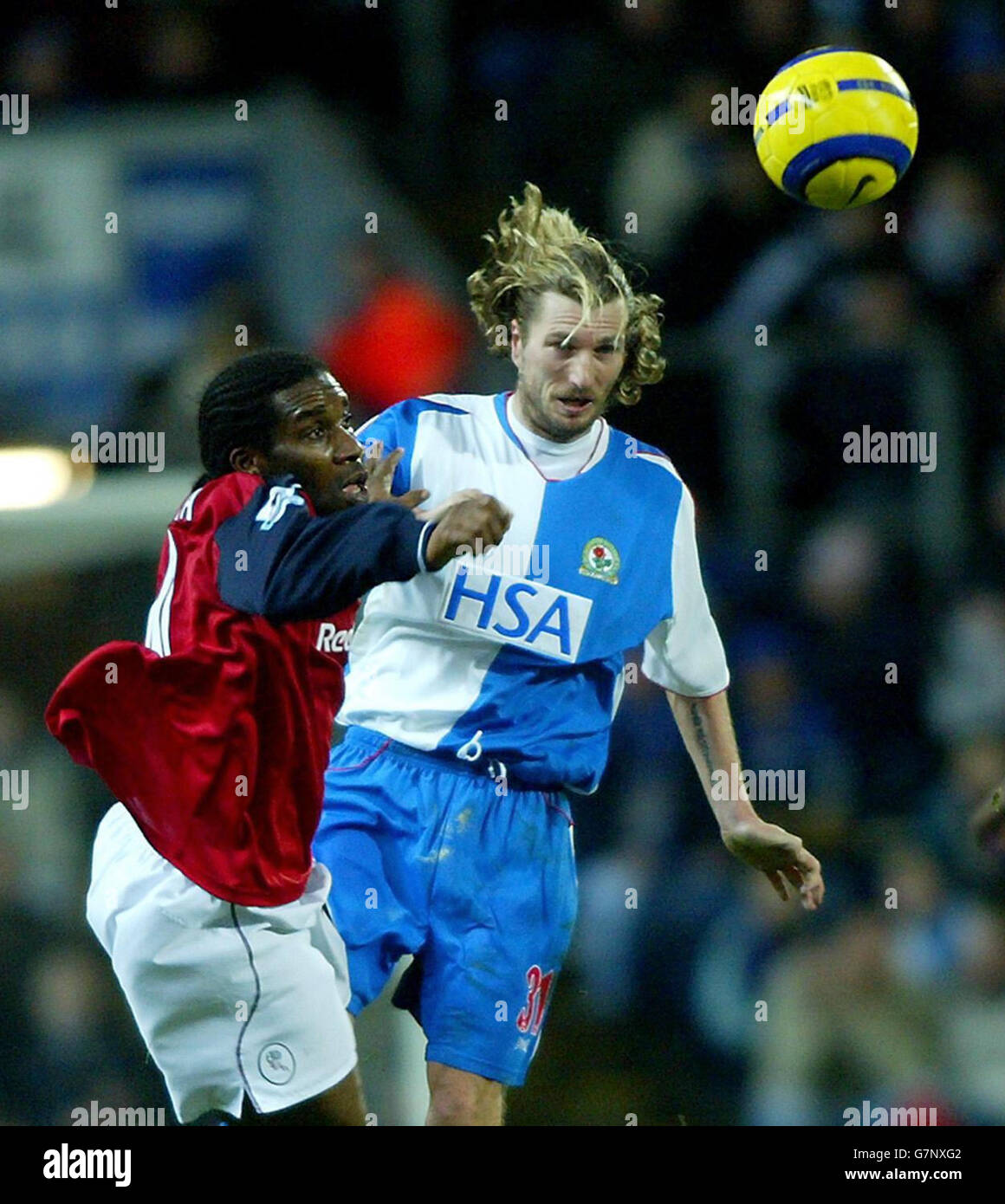 Blackburn Rovers' Robbie Savage (R) battles with Bolton Wanderers' Jay ...