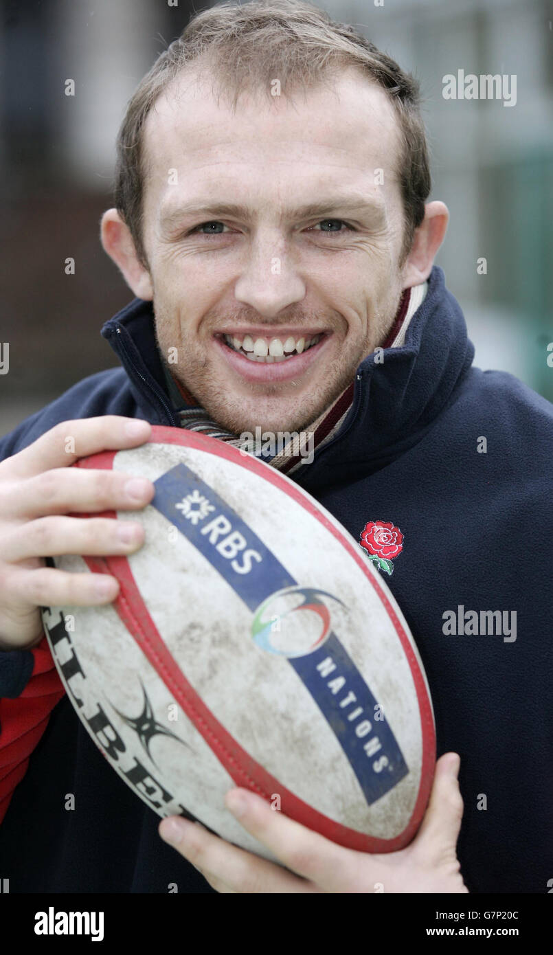 Posing head shot holding ball smiling hostpics hi-res stock photography ...