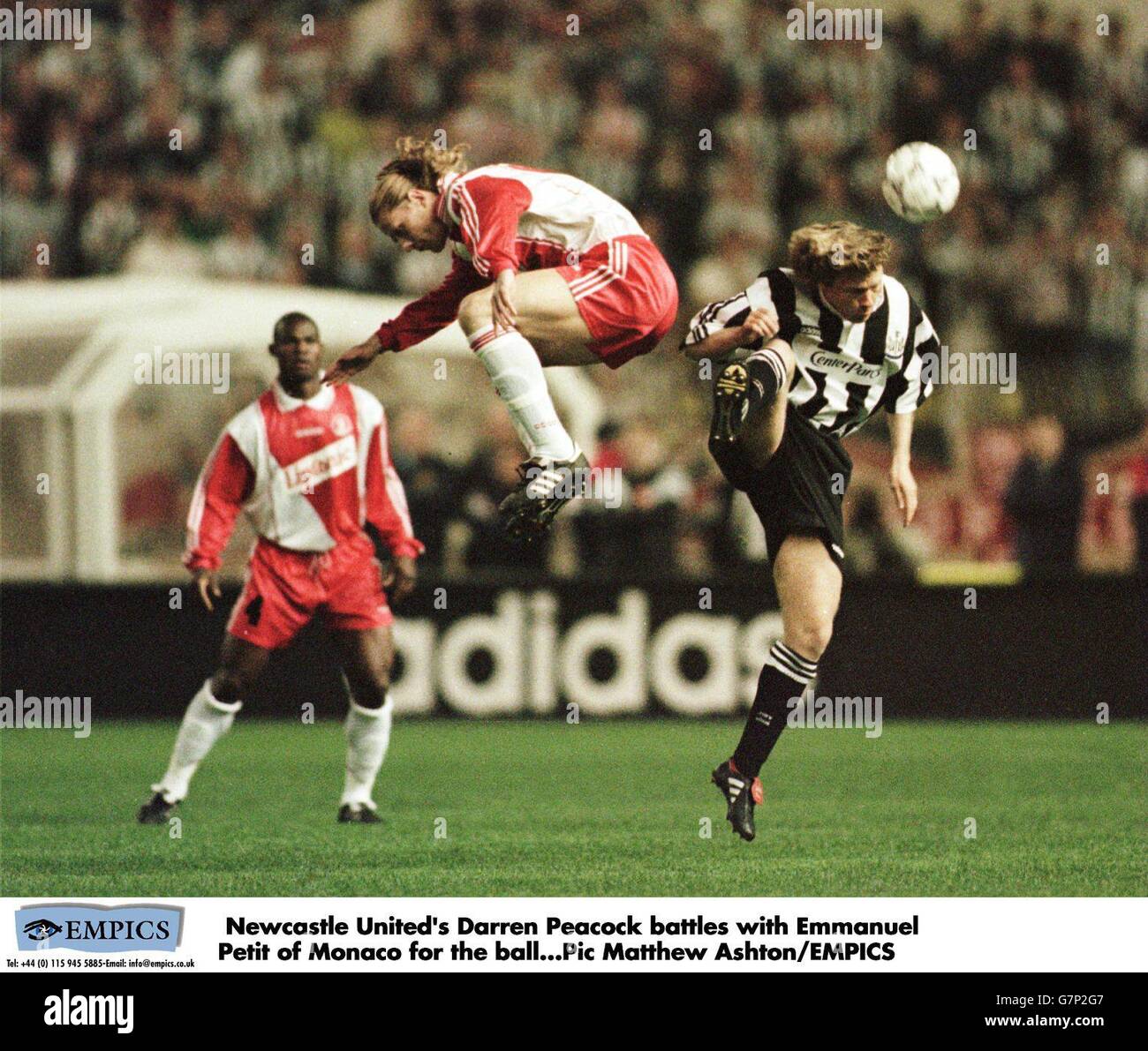 Newcastle United's Darren Peacock battles with Emmanuel Petit of Monaco ...