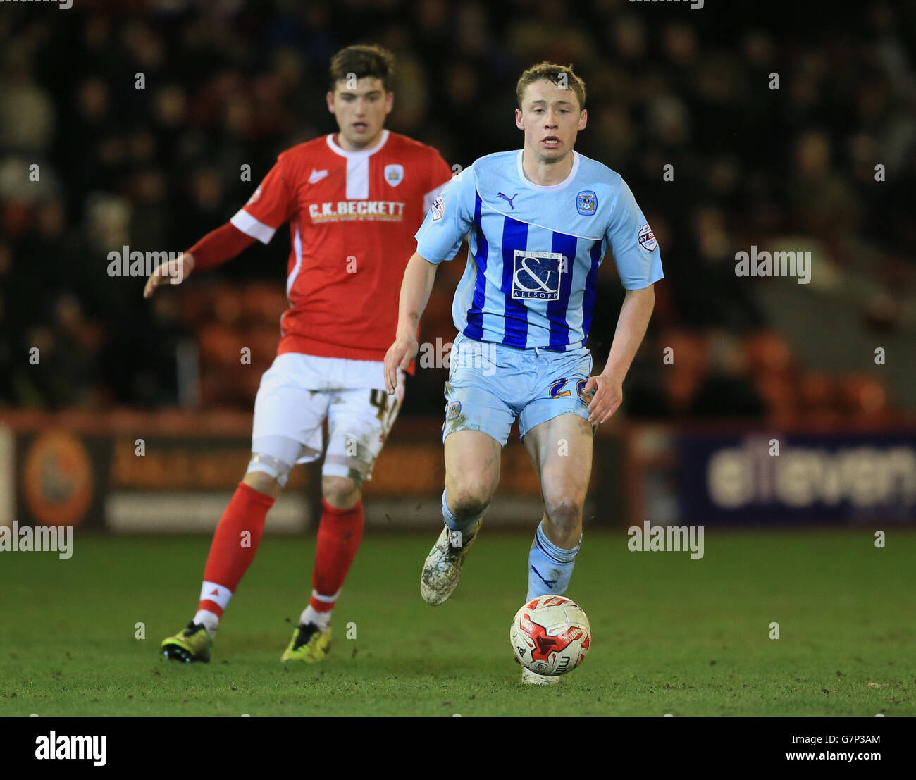 Barnsley's George Waring (left) and Coventry City's Matthew Pennington ...