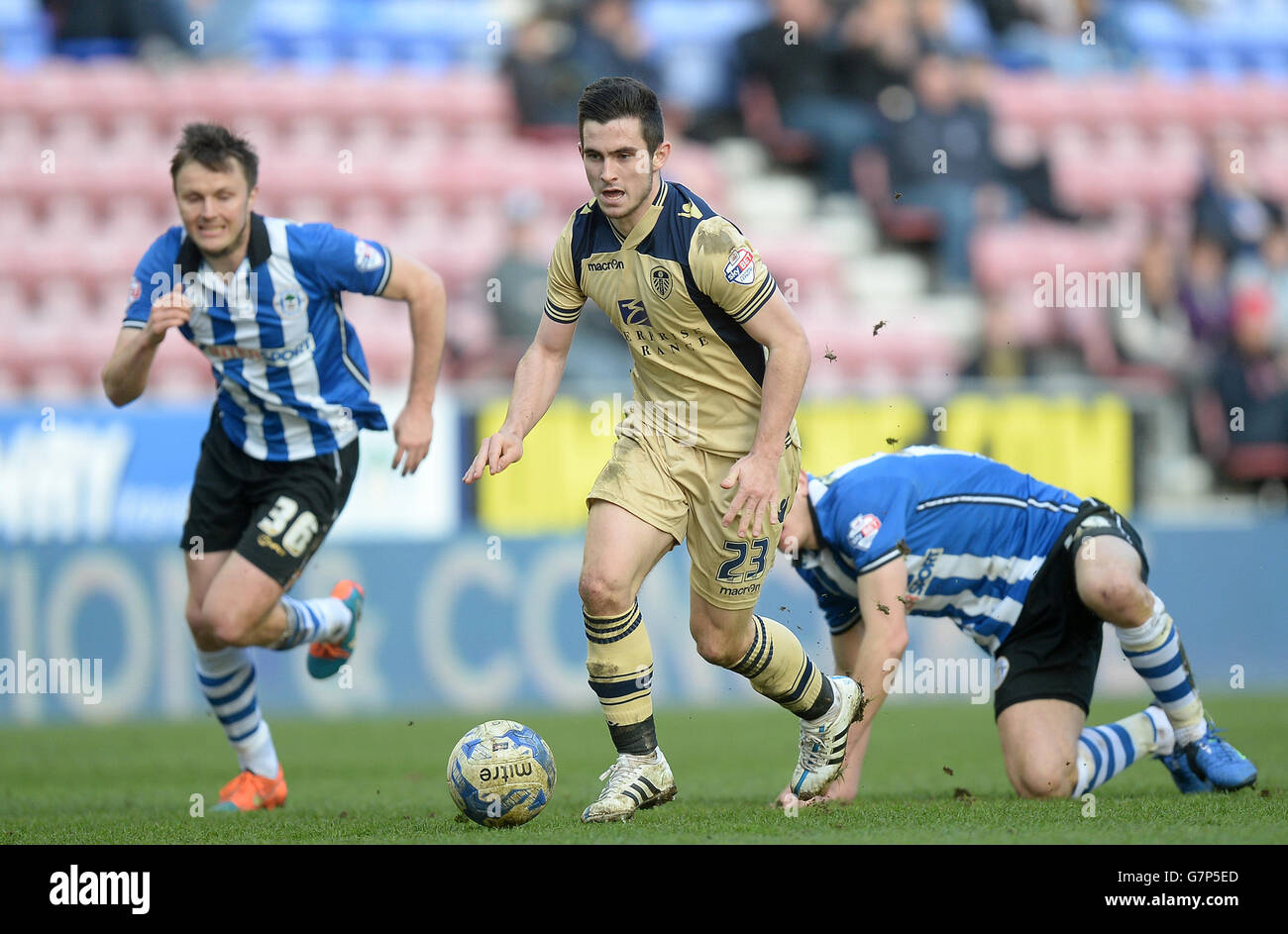 Leeds uniteds lewis cook in action against wigan athletic hi-res stock ...