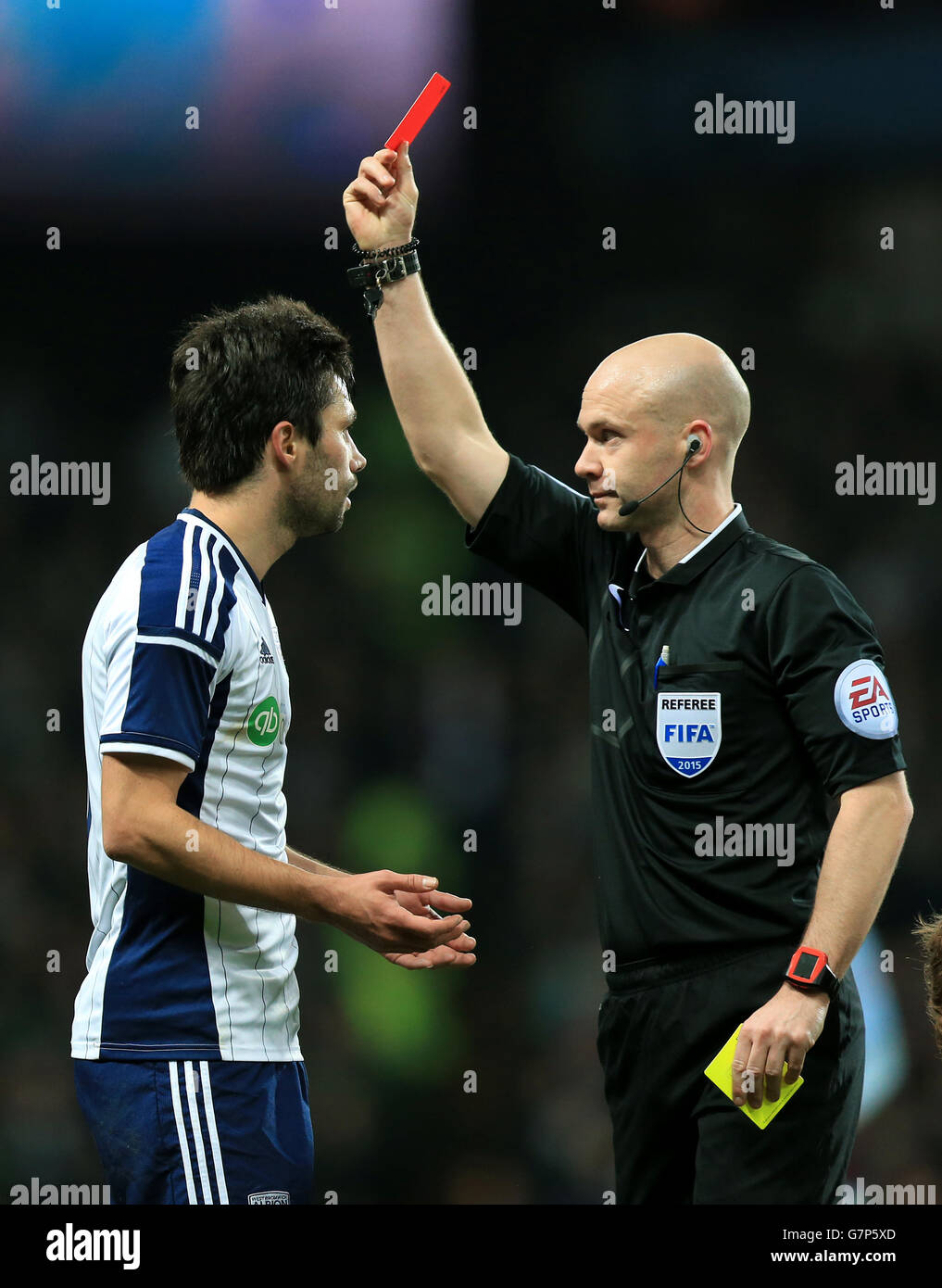 West Bromwich Albion's Claudio Yacob is shown the red card by referee ...
