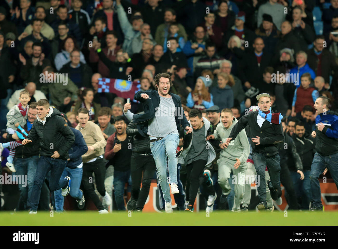 Aston Villa fans celebrate as they invade the pitch after the final ...