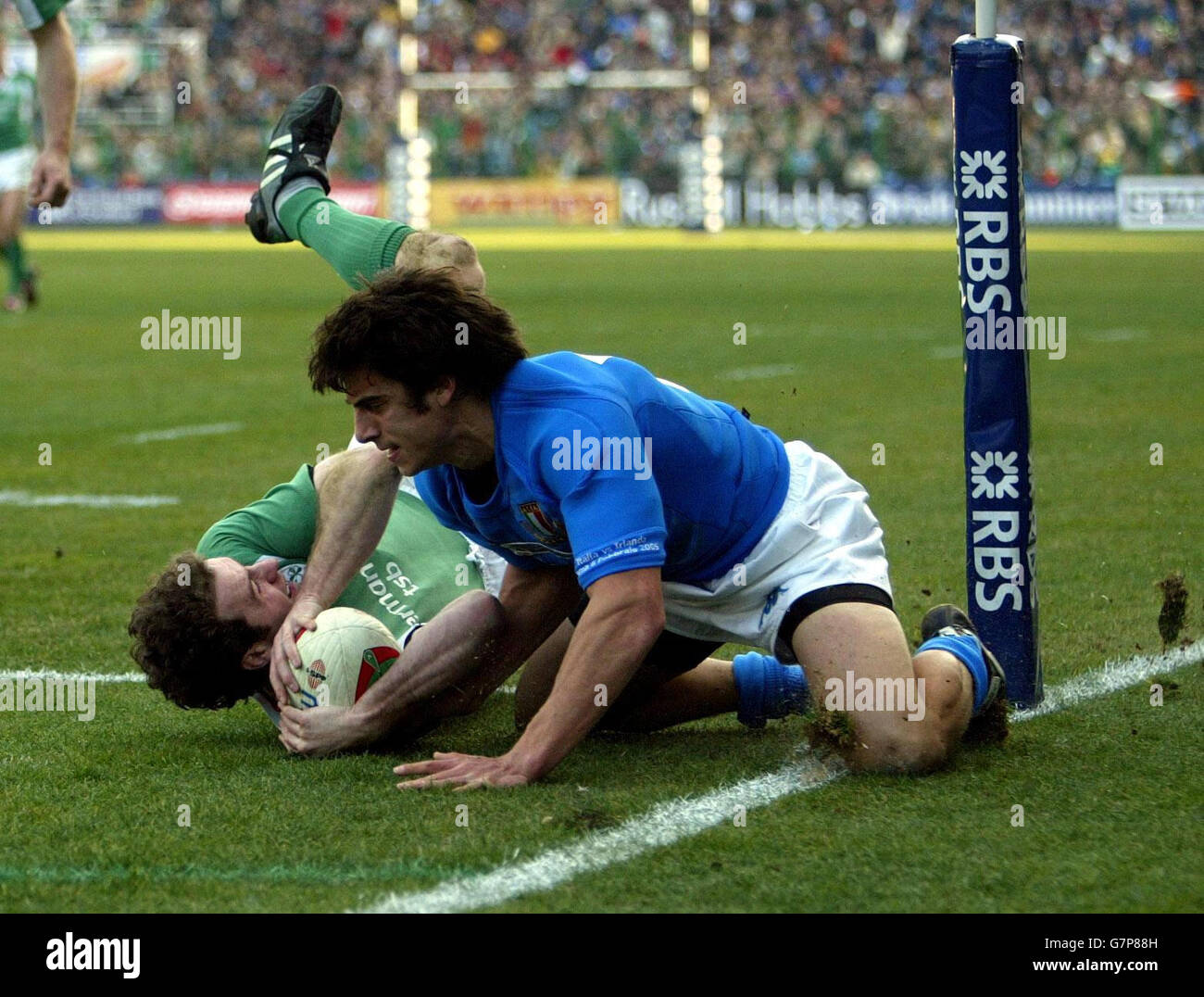 Ireland's Geordan Murphy (left) touches down to score the first try ...