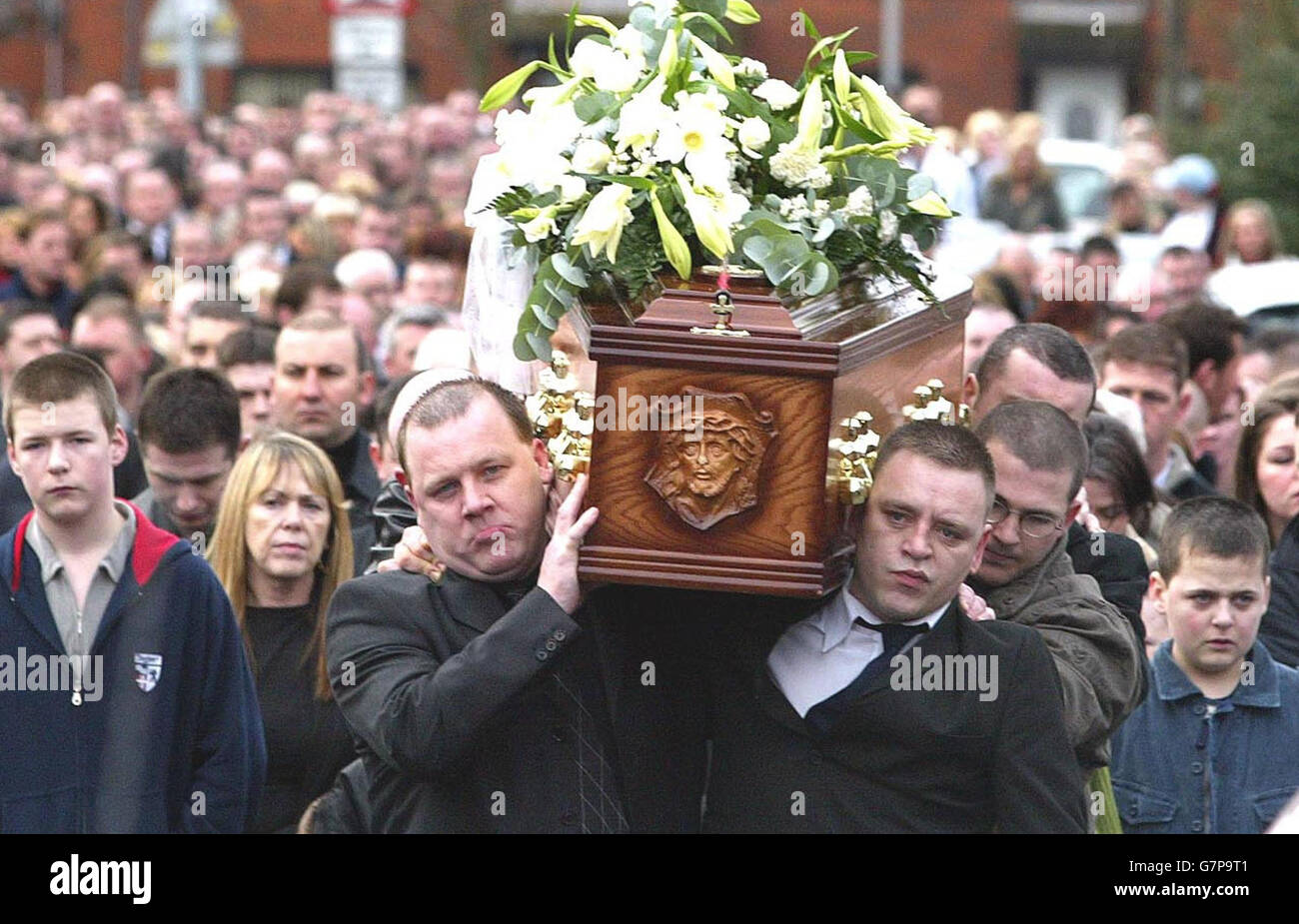 The funeral cortege of murder victim, Robert McCartney, makes its way ...