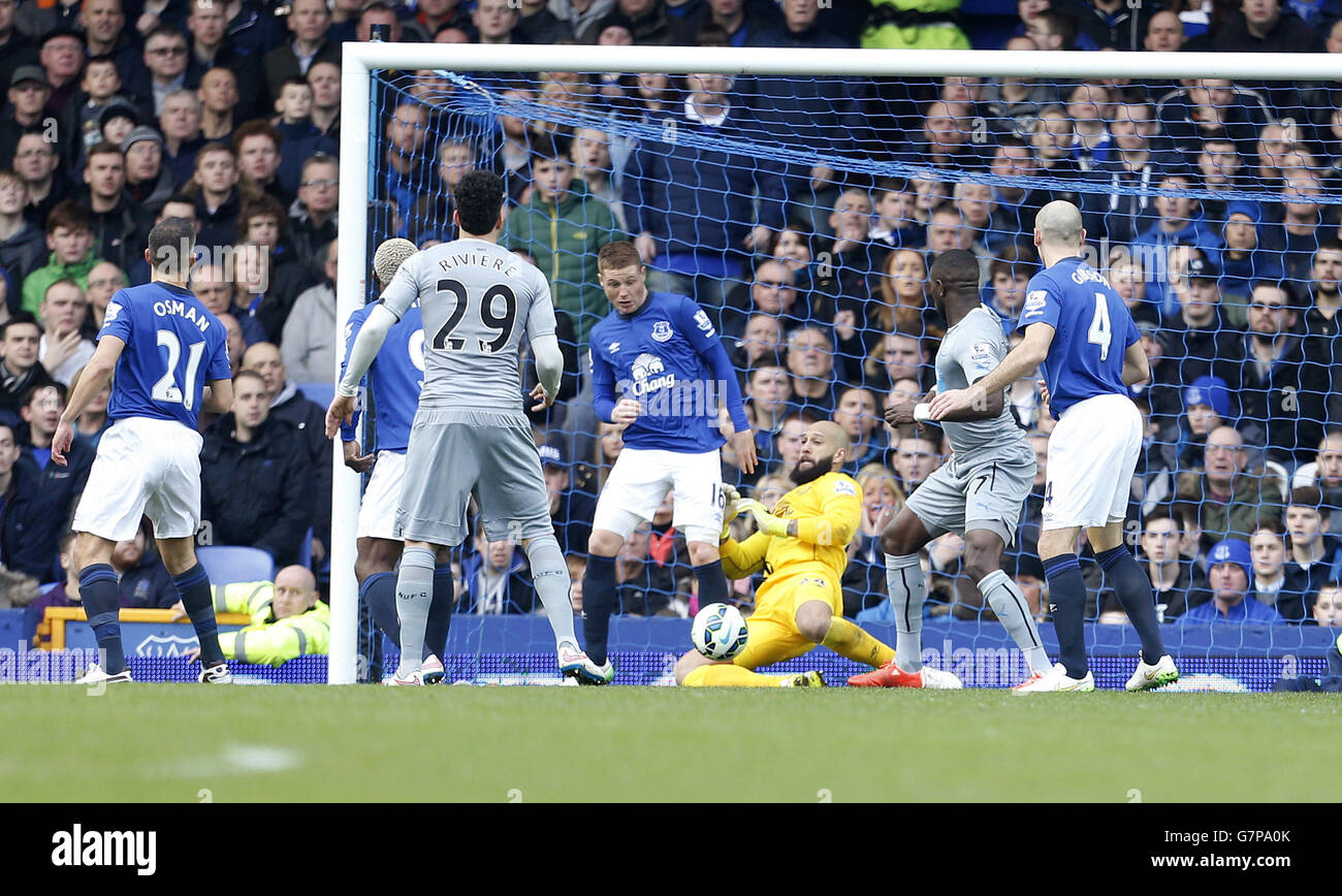 Everton Goalkeeper Tim Howard saves on the line during the Barclays ...