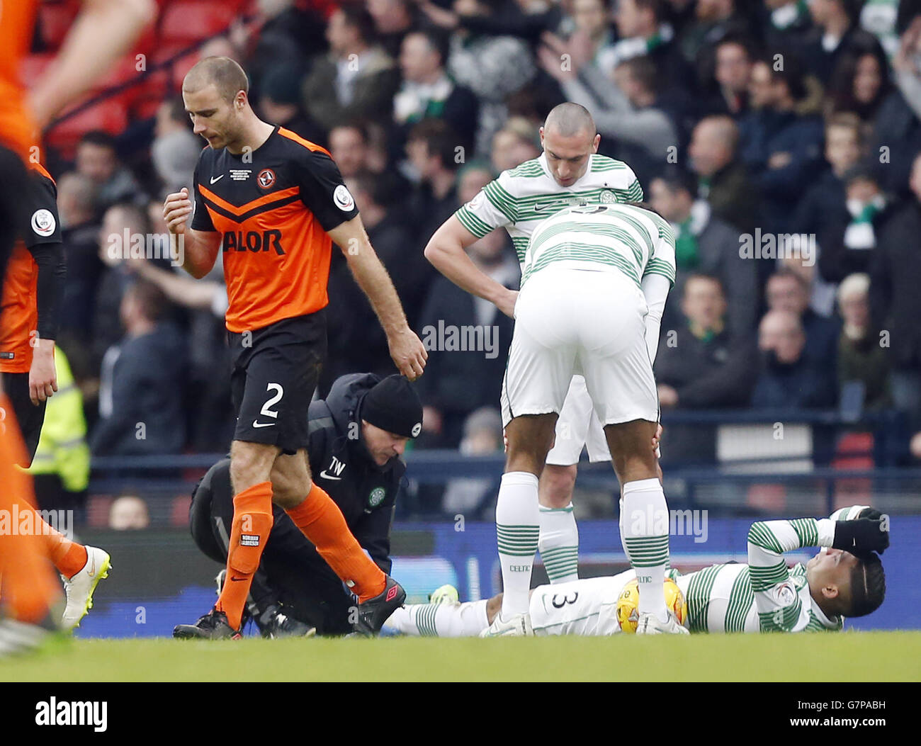 Dundee United's Sean Dillon walks off the pitch after receiving a red ...