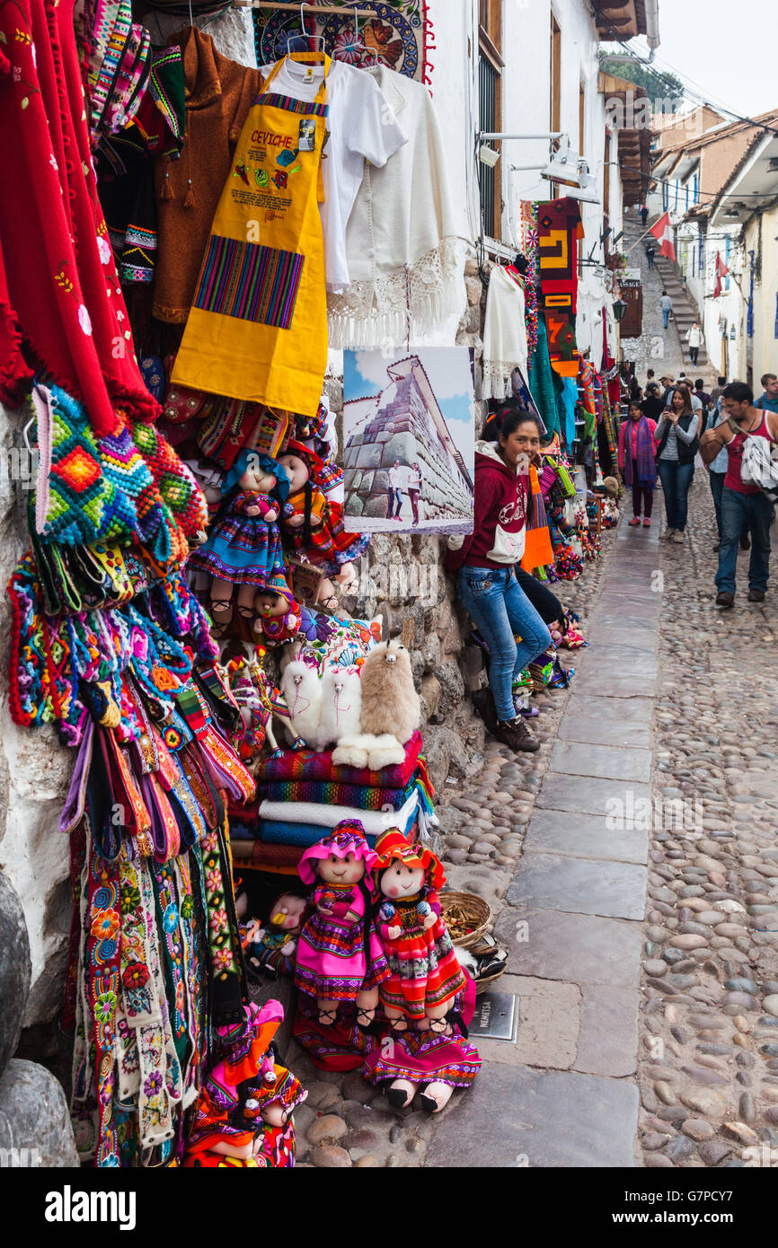 Small street in Cusco with tourist souvenirs on display Stock Photo - Alamy