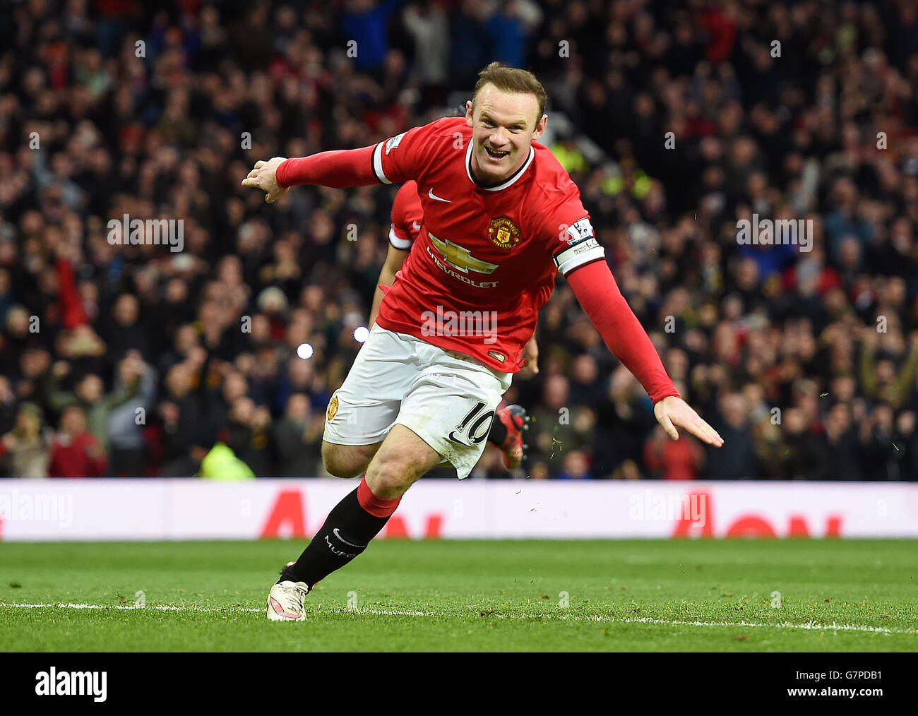 Manchester United's Wayne Rooney celebrates scoring his side's first ...