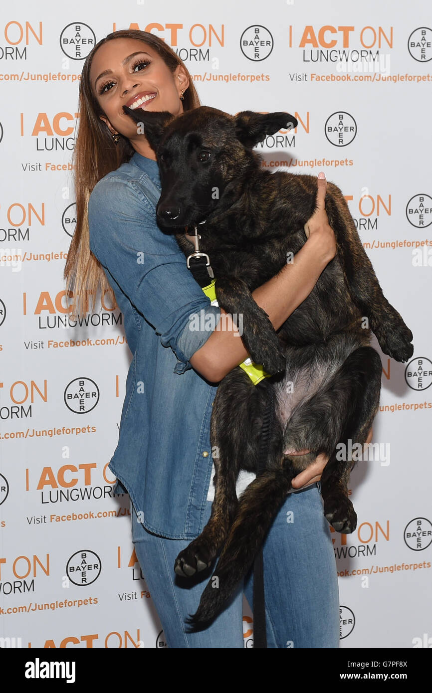 Alesha Dixon poses with a police dog to support the 'Be Lungworm Aware ...