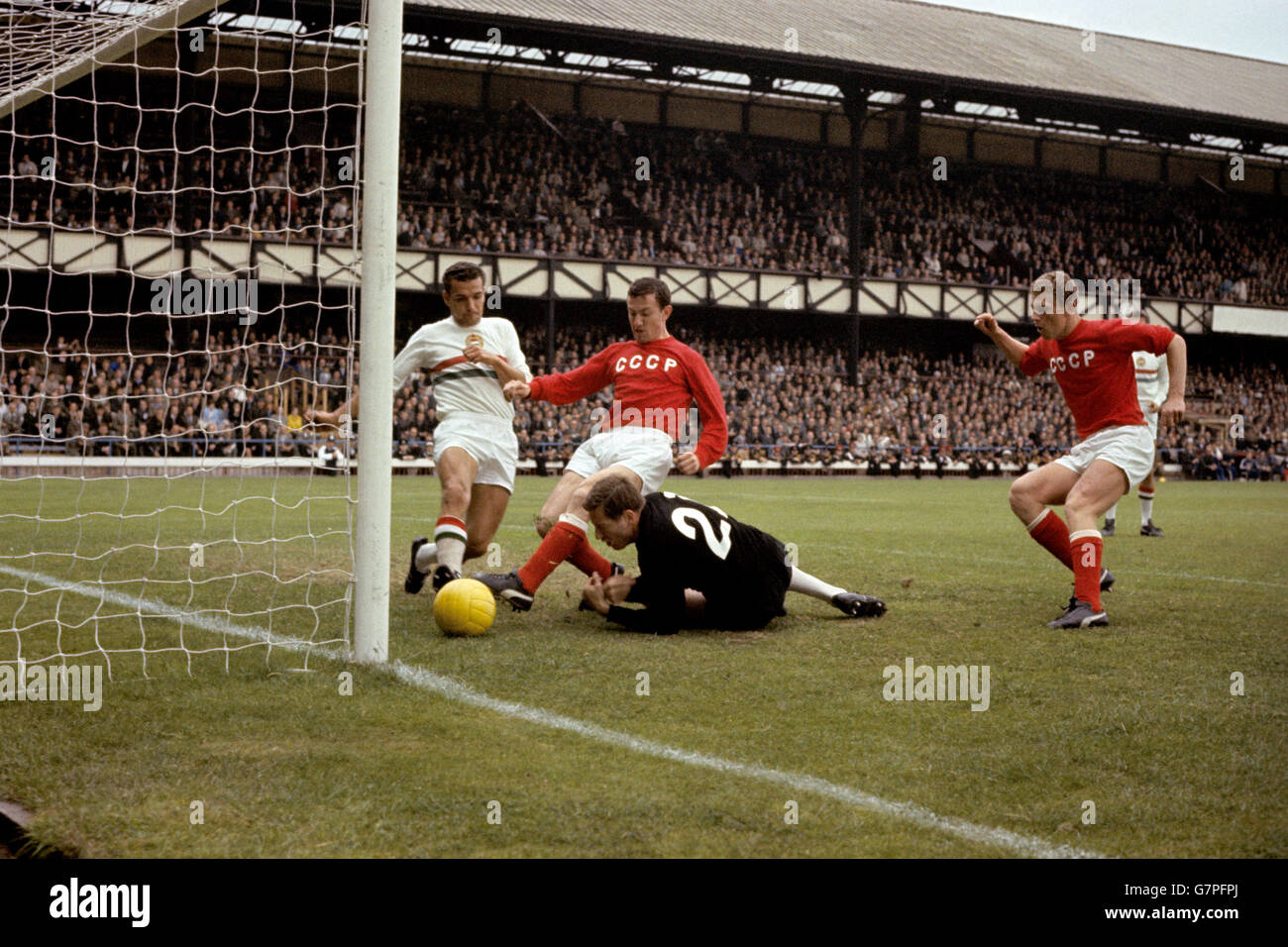 Ussrs igor chislenko second l taps home the opening goal hi-res stock ...