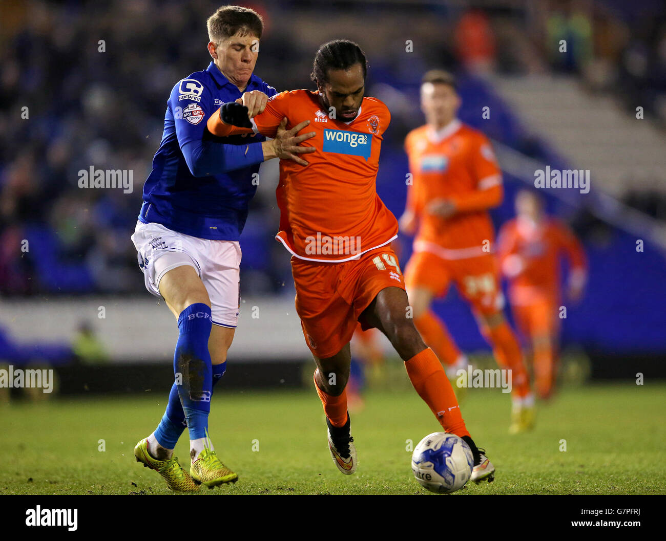 Birmingham City's Rob Kiernan (left) and Blackpool's Nathan Delfouneso ...