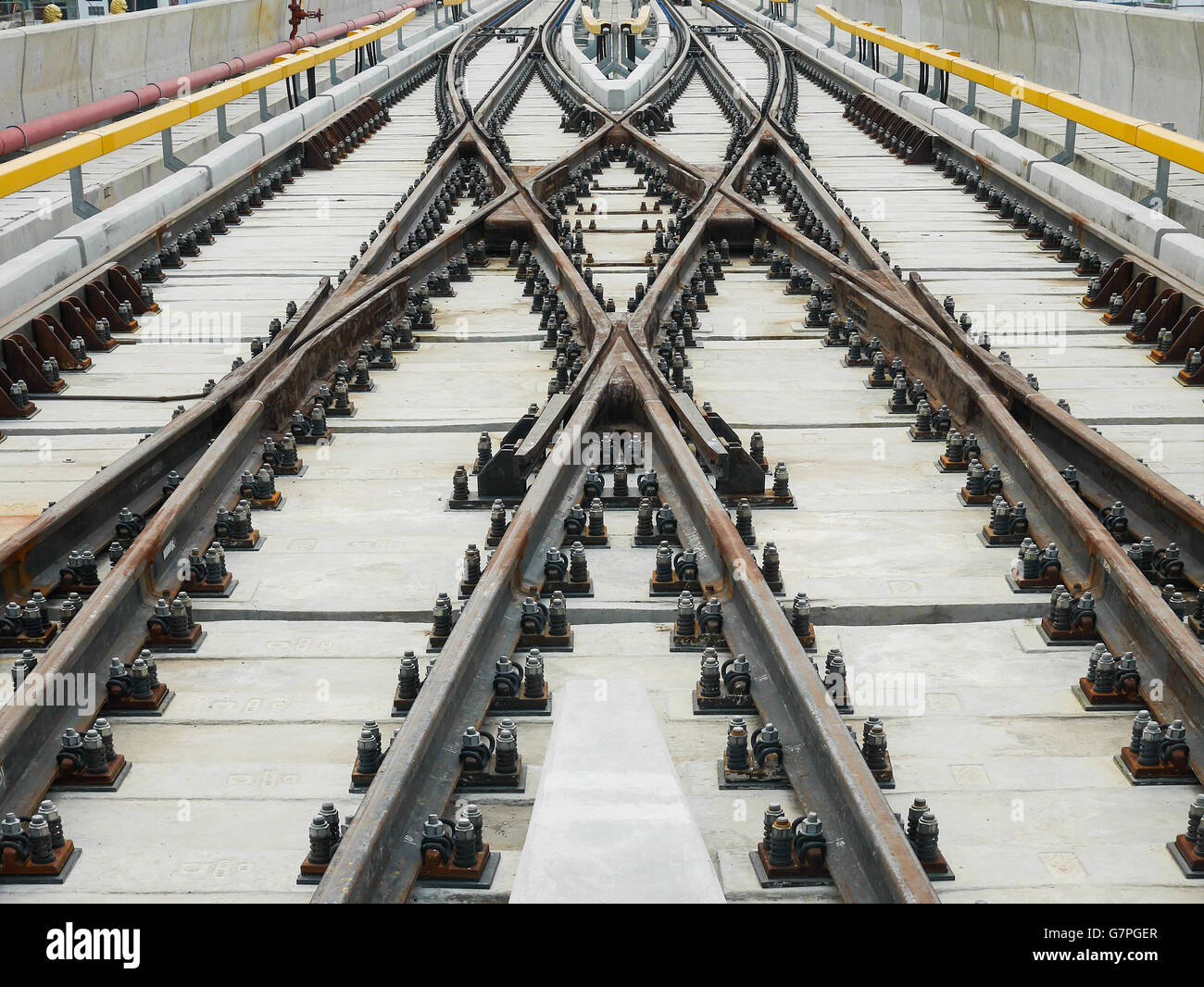 The railway track at scissor turnout section Stock Photo - Alamy