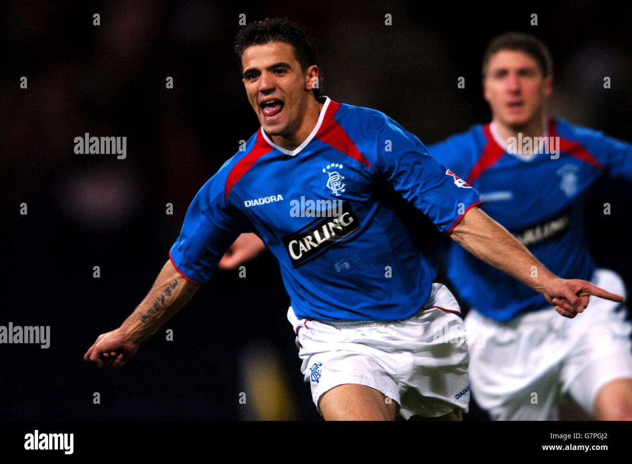 Rangers' Nacho Novo celebrates scoring their opening goal Stock Photo ...
