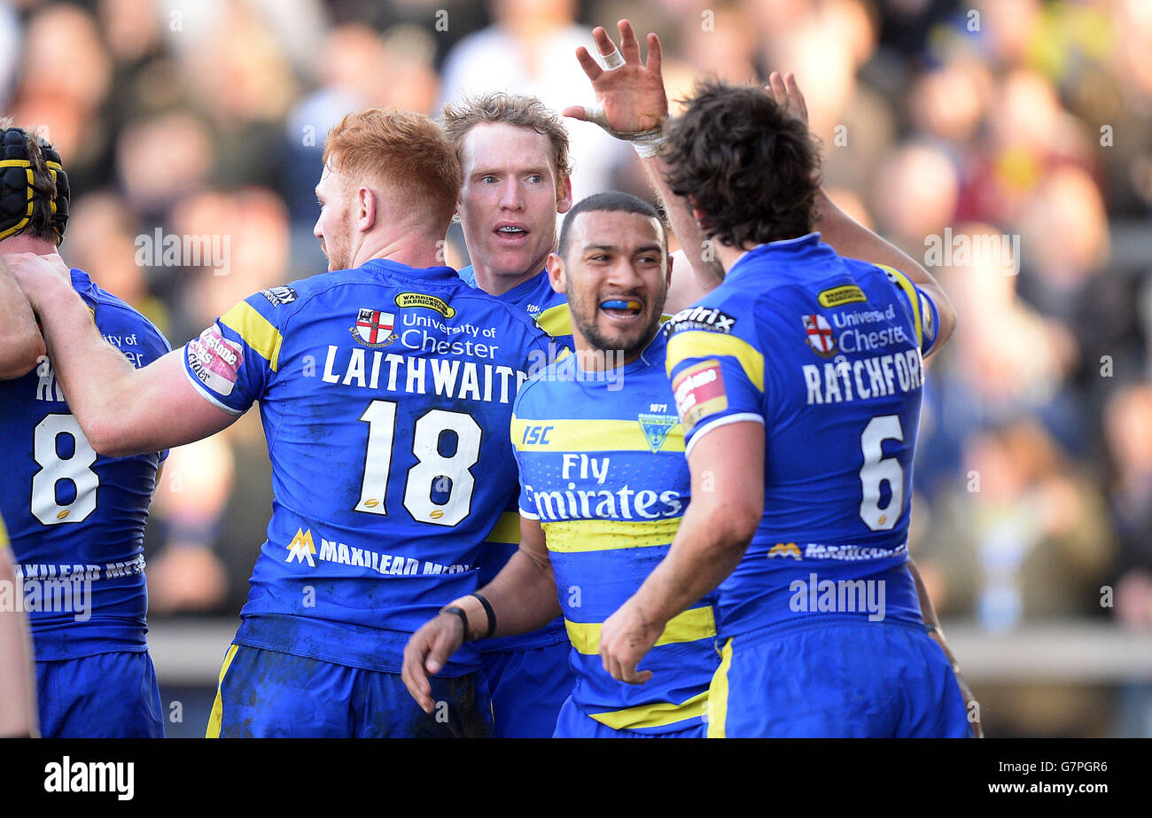 Warrington Wolves' Joel Monaghan celebrates his try against Hull ...