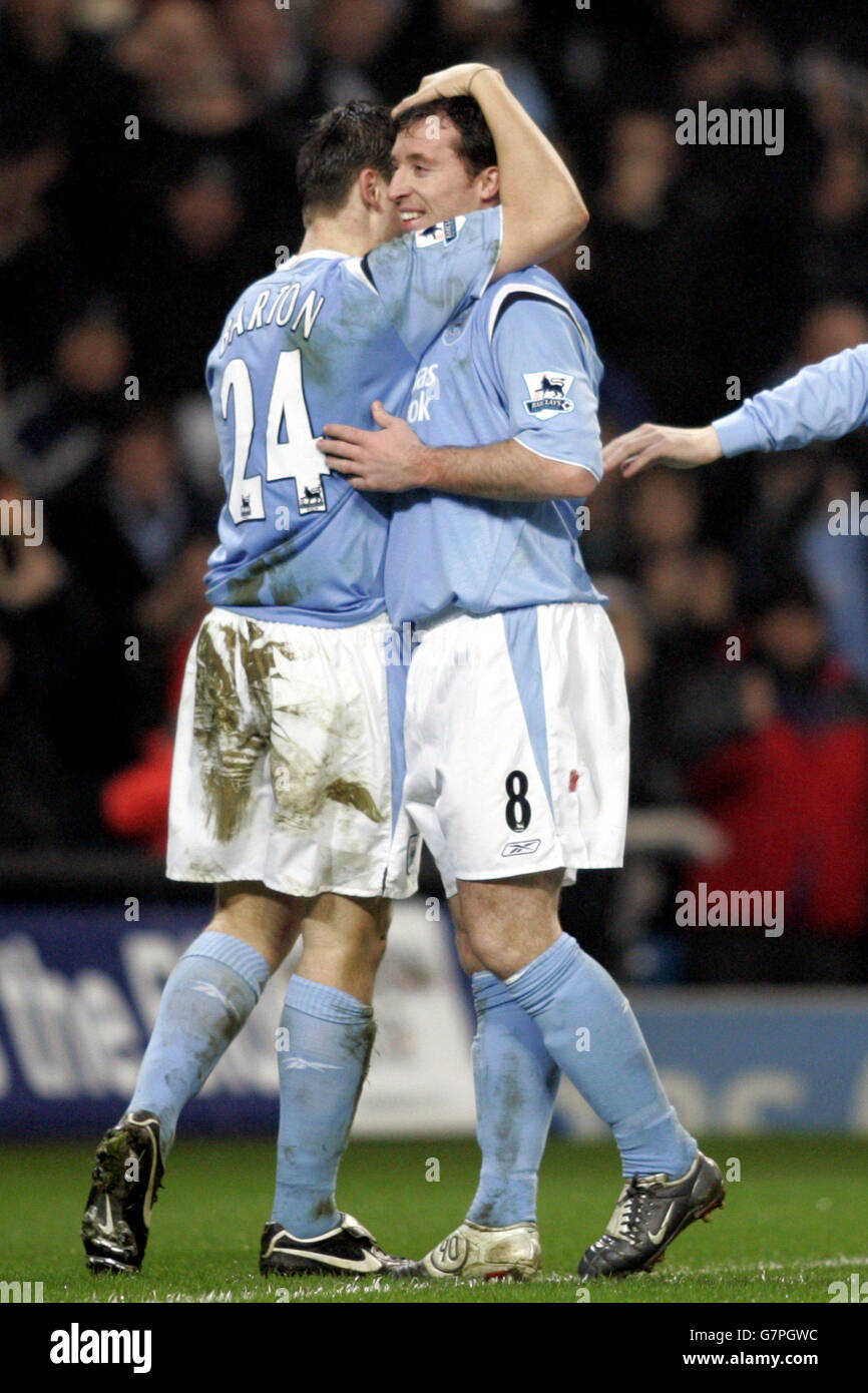 Manchester citys robbie fowler celebrates with joey after scoring hi ...