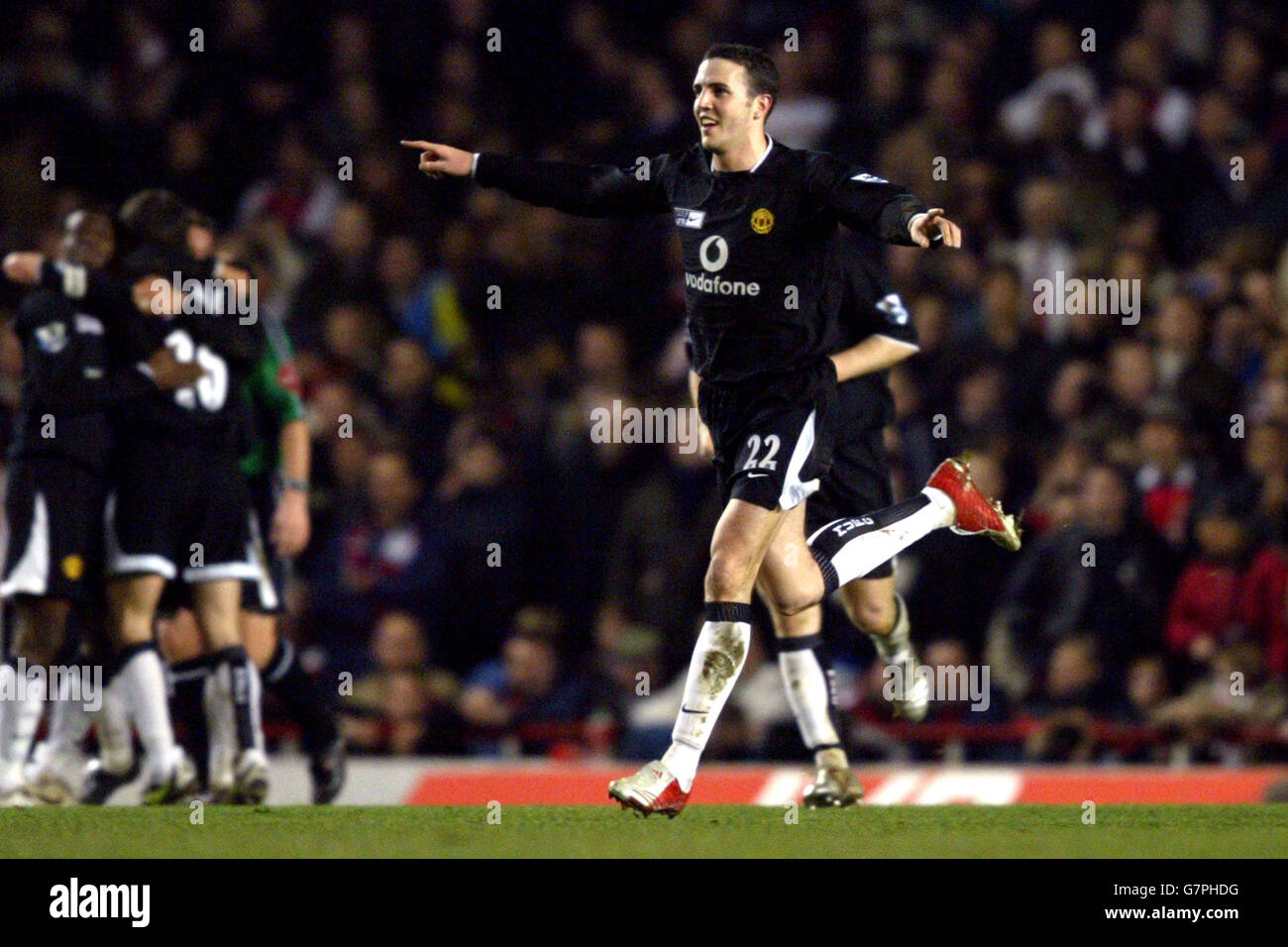 Manchester United's John O'Shea celebrates scoring the fourth goal ...