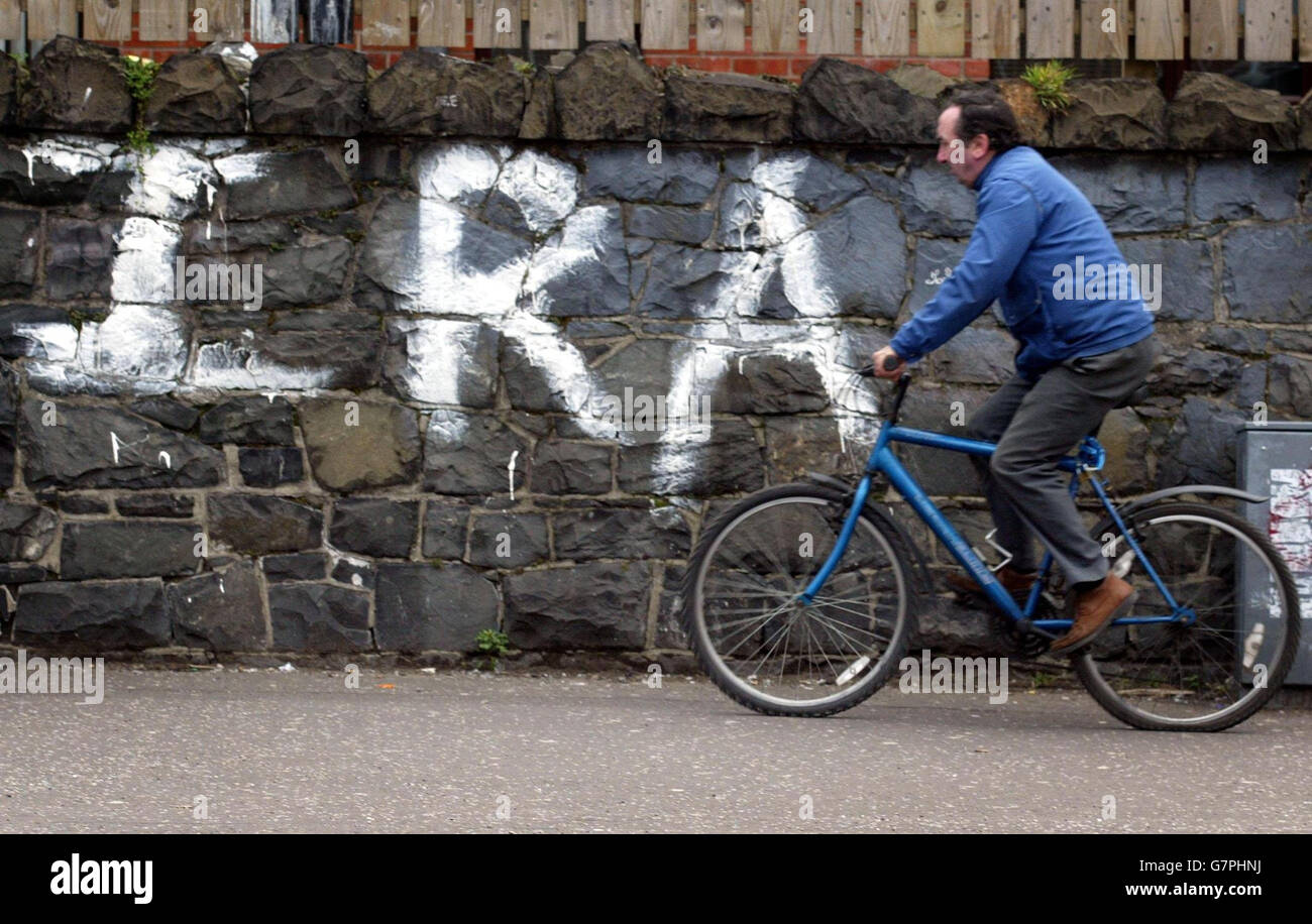 Graffiti on a wall in the Republican Falls Road area following the IRA ...