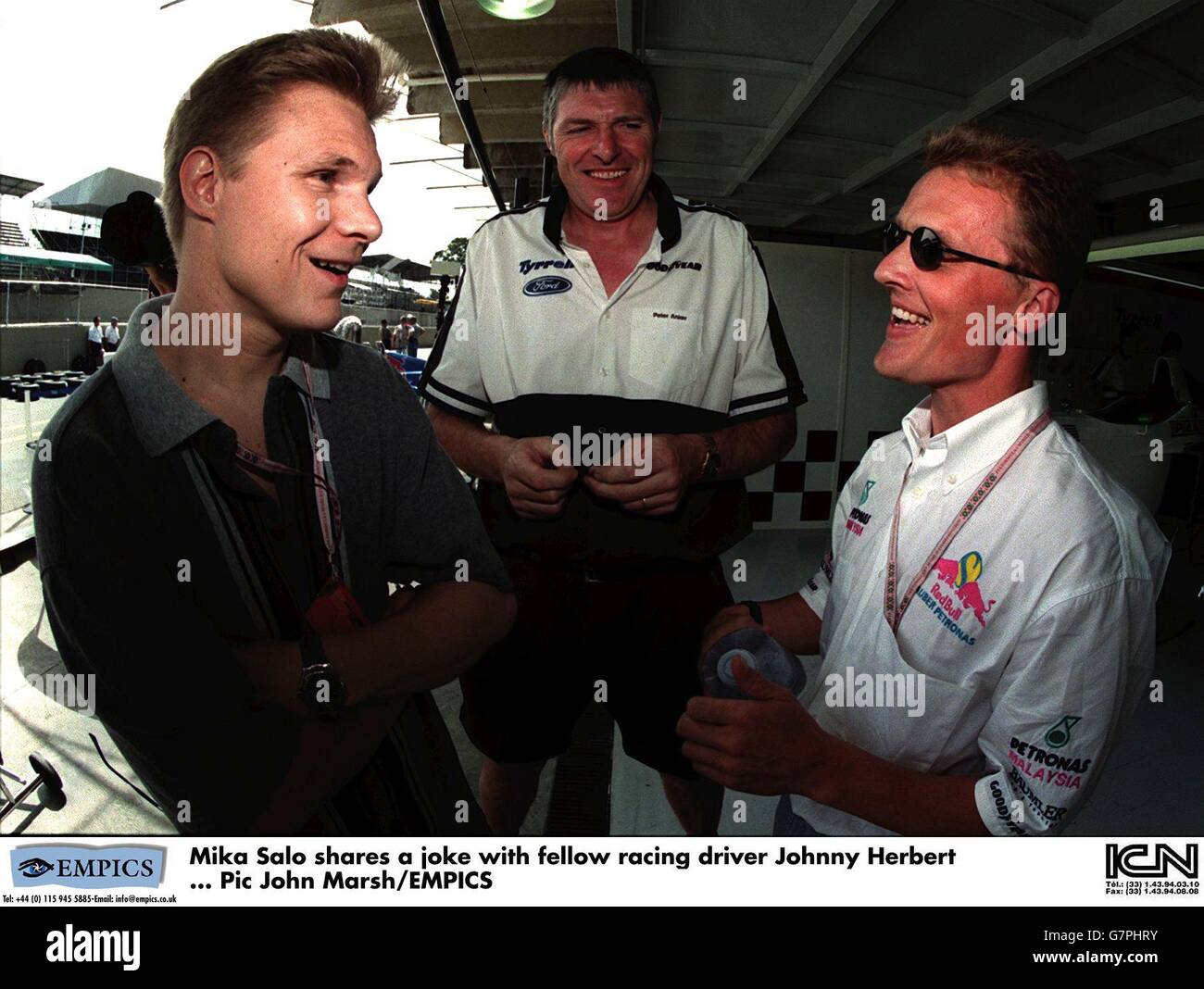 Motor Racing ... Brazilian Grand Prix. Mika Salo shares a joke with ...