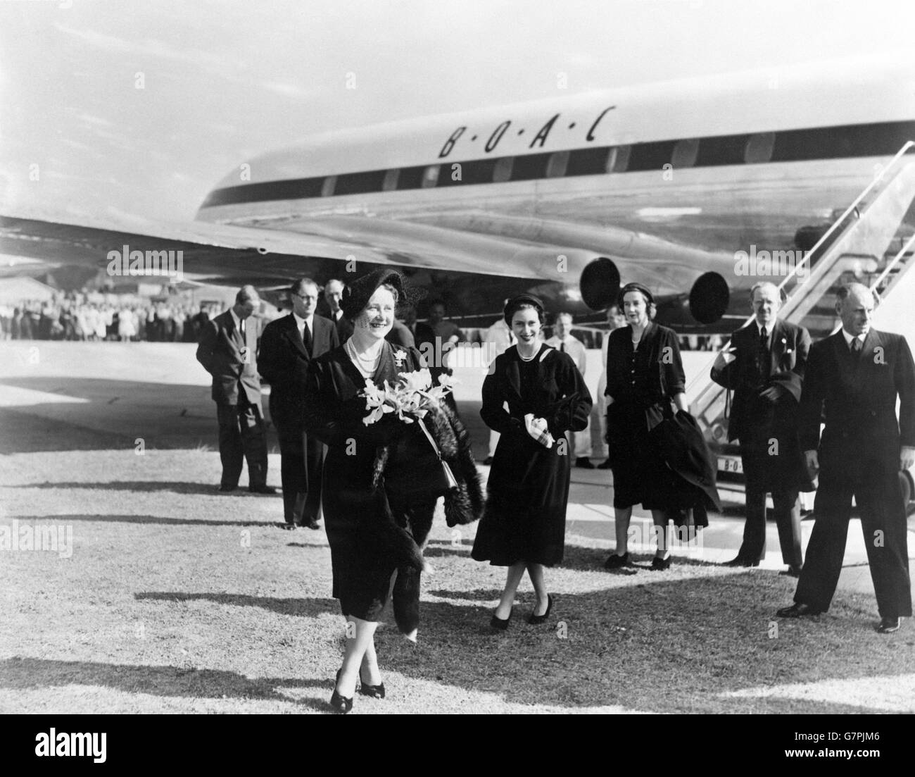 The Queen Mother and Princess Margaret smiling as they left the Comet ...