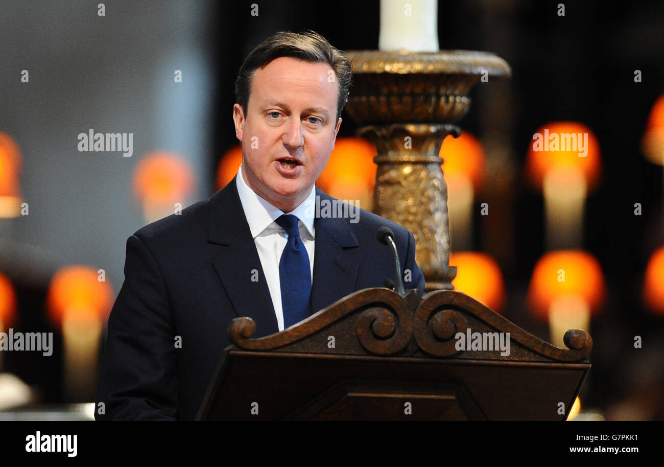 Prime Minister David Cameron gives a reading at the commemoration ...