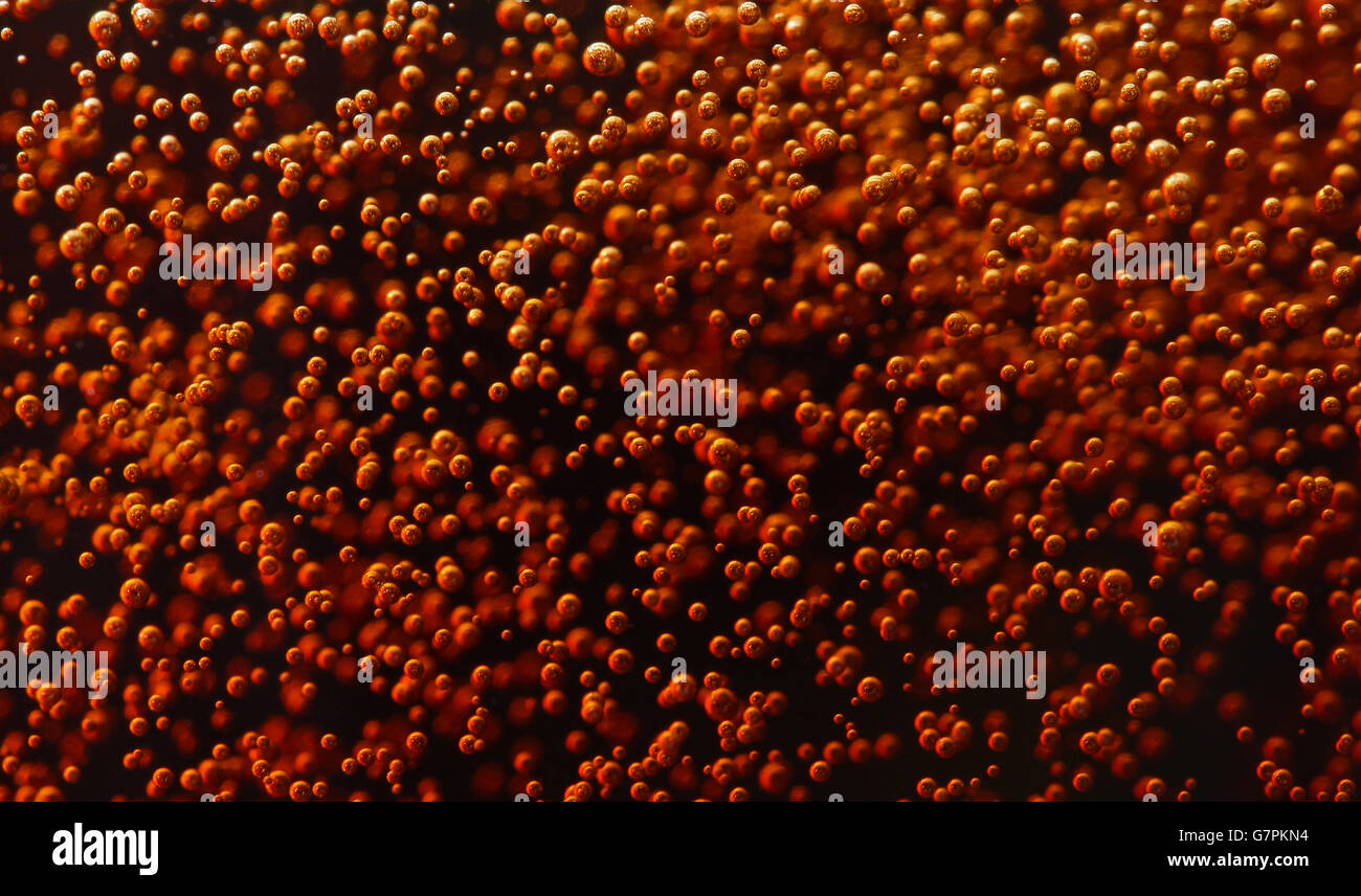 Macro shot of cola bubbles Stock Photo - Alamy
