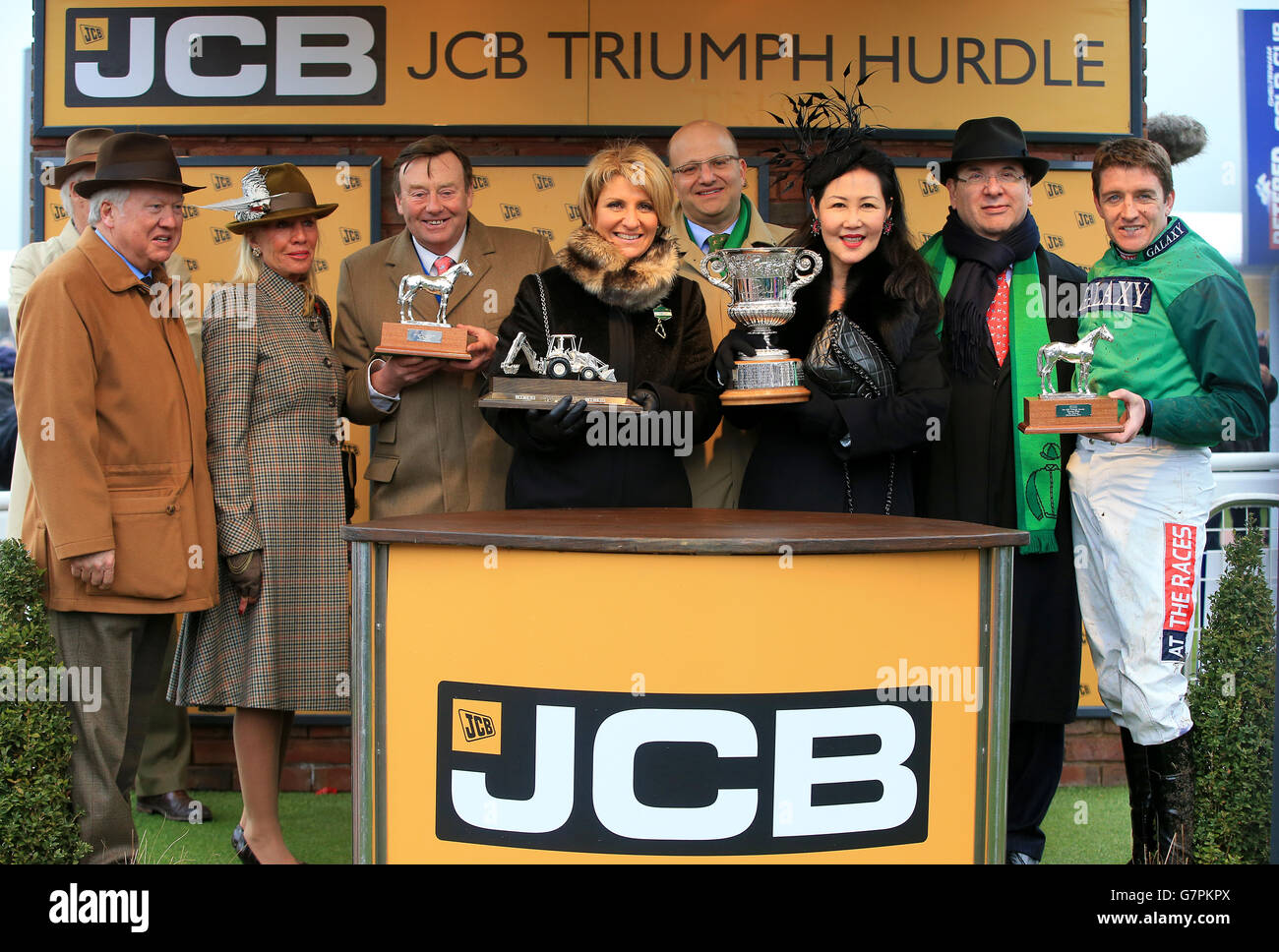 Trainer Nicky Henderson And Owners Of Peace And Co With Jockey Barry
