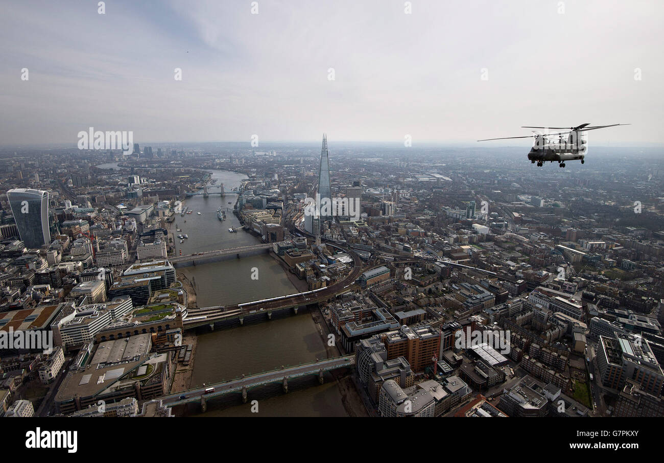 A Royal Air Force Chinook flies over central London on its way to St ...