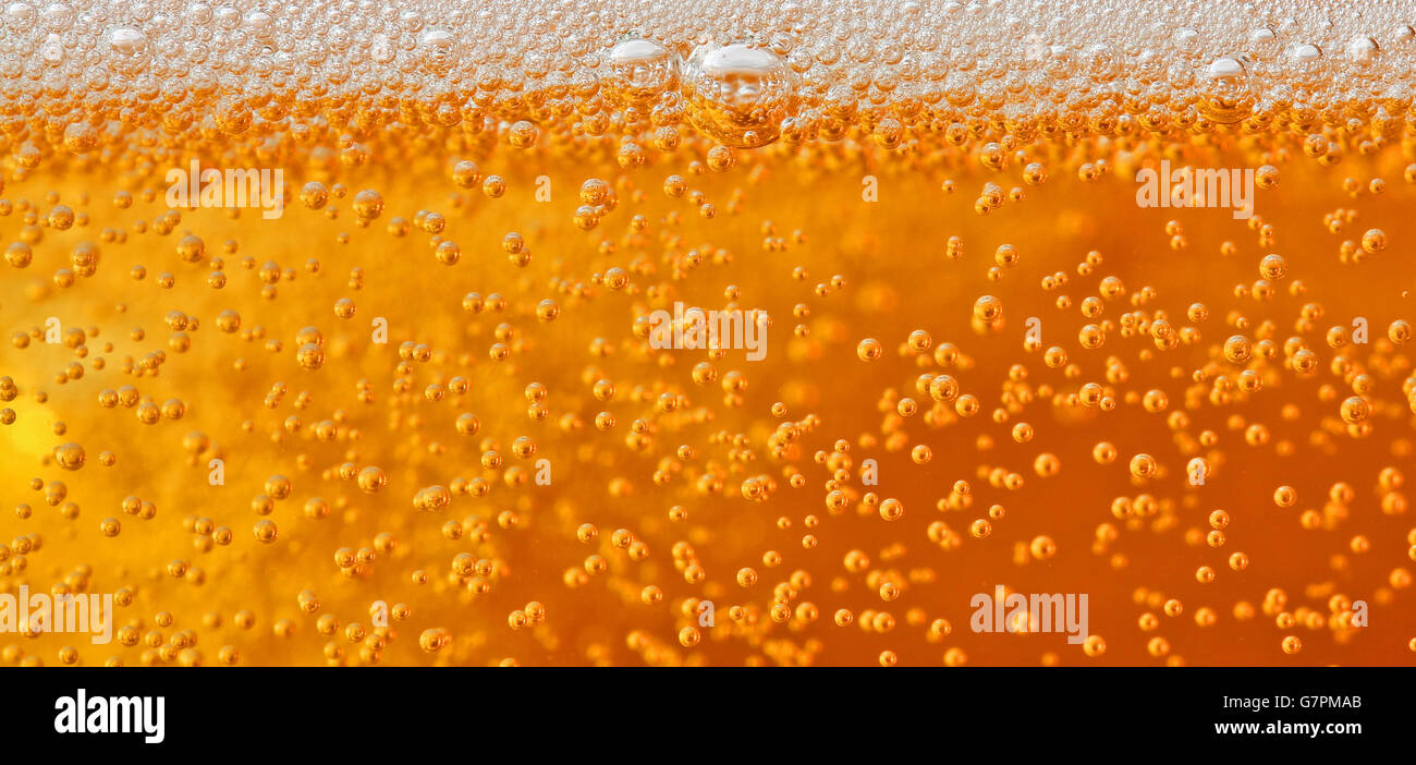Beer bubbles with foam Stock Photo - Alamy