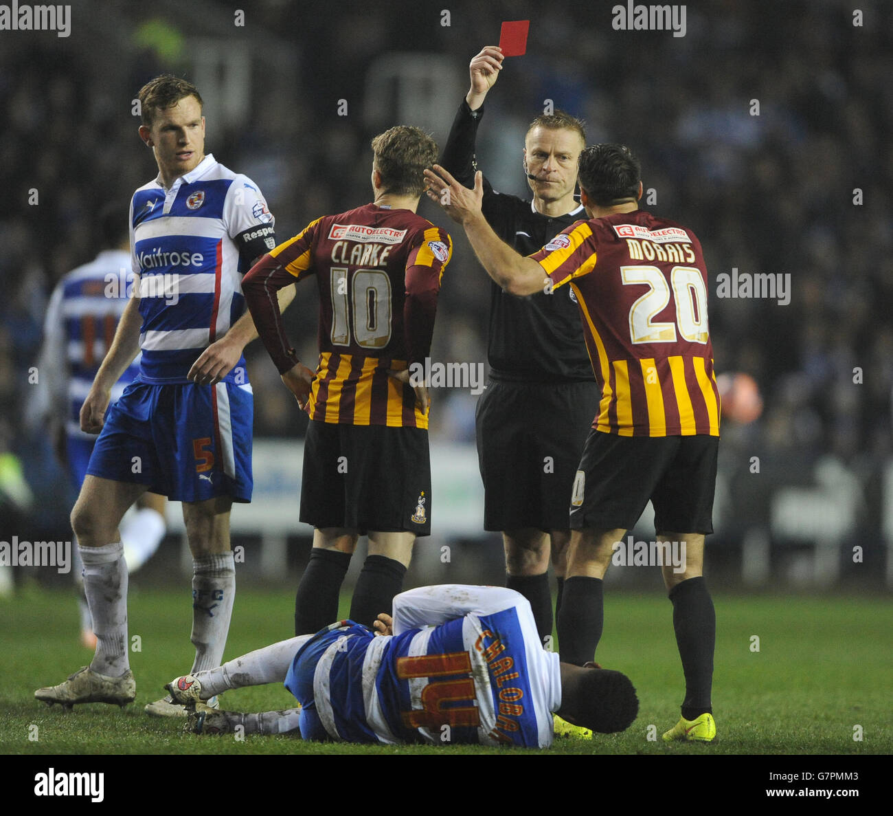Referee Mike Jones shows a red card to Bradford's Filipe Morais during ...
