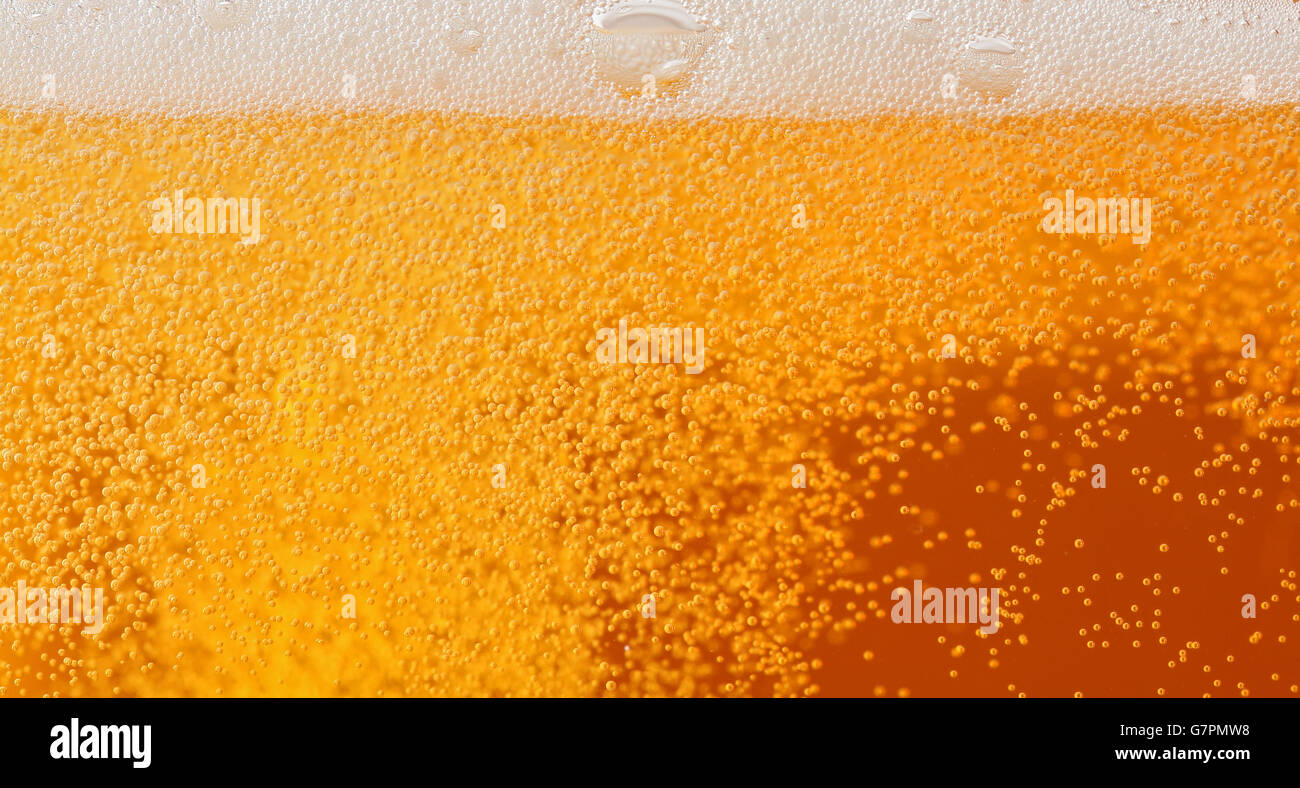 Beer bubbles with foam Stock Photo - Alamy