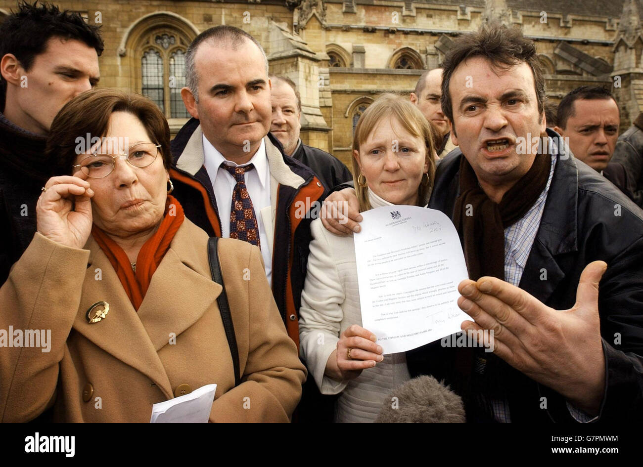 Gerry Conlon and Annie McGuire (far left) face the media as they leave ...