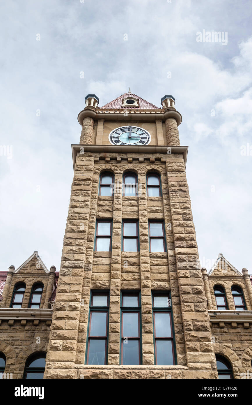 Calgary city hall with its lofty clock tower and sandstone facade Stock ...