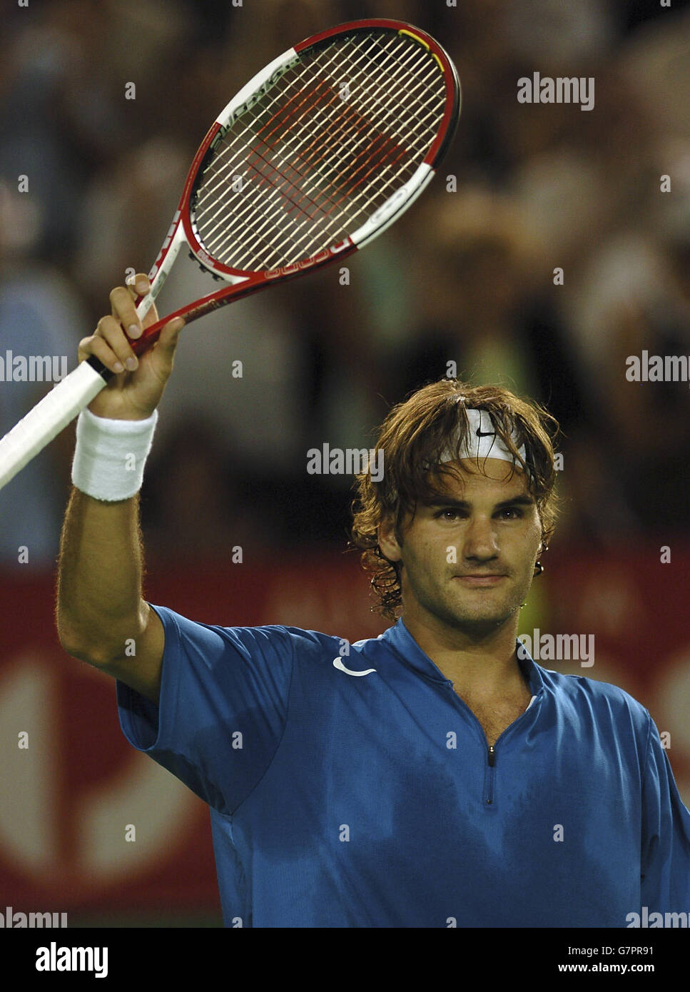 Switzerland's Roger Federer celebrates defeating USA's Andre Agassi ...