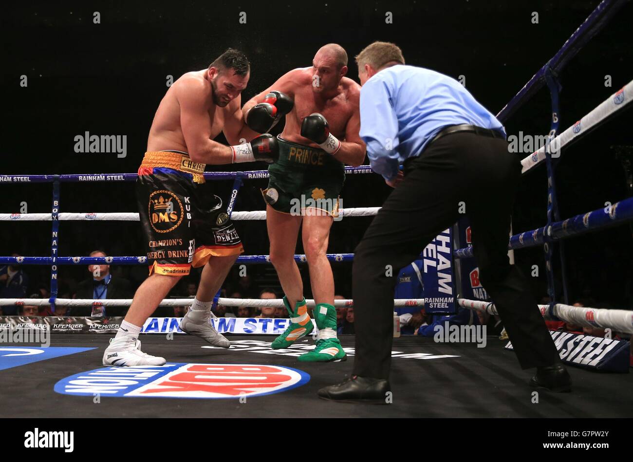 Tyson Fury (centre) in action against Christian Hammer during their WBO ...