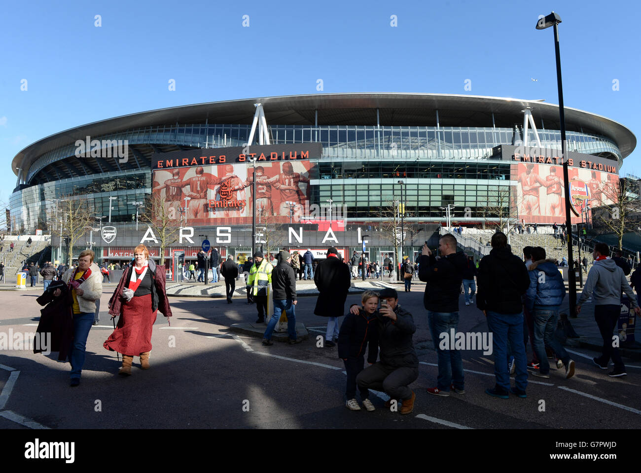 Fans outside the Emirates Stadium before the Barclays Premier League ...