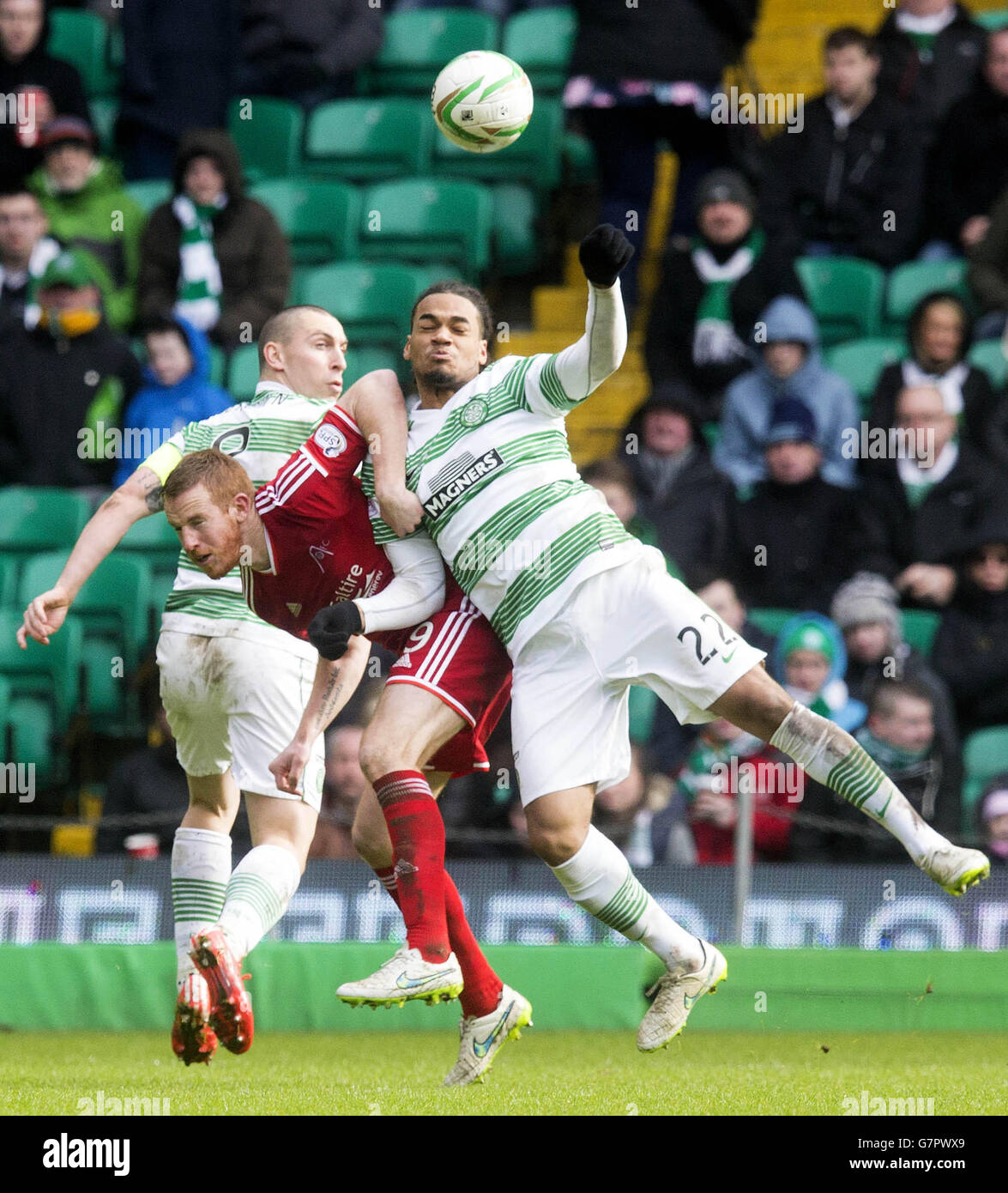 Celtic Jason Denayer and Aberdeen's Adam Rooney battle for the ball ...