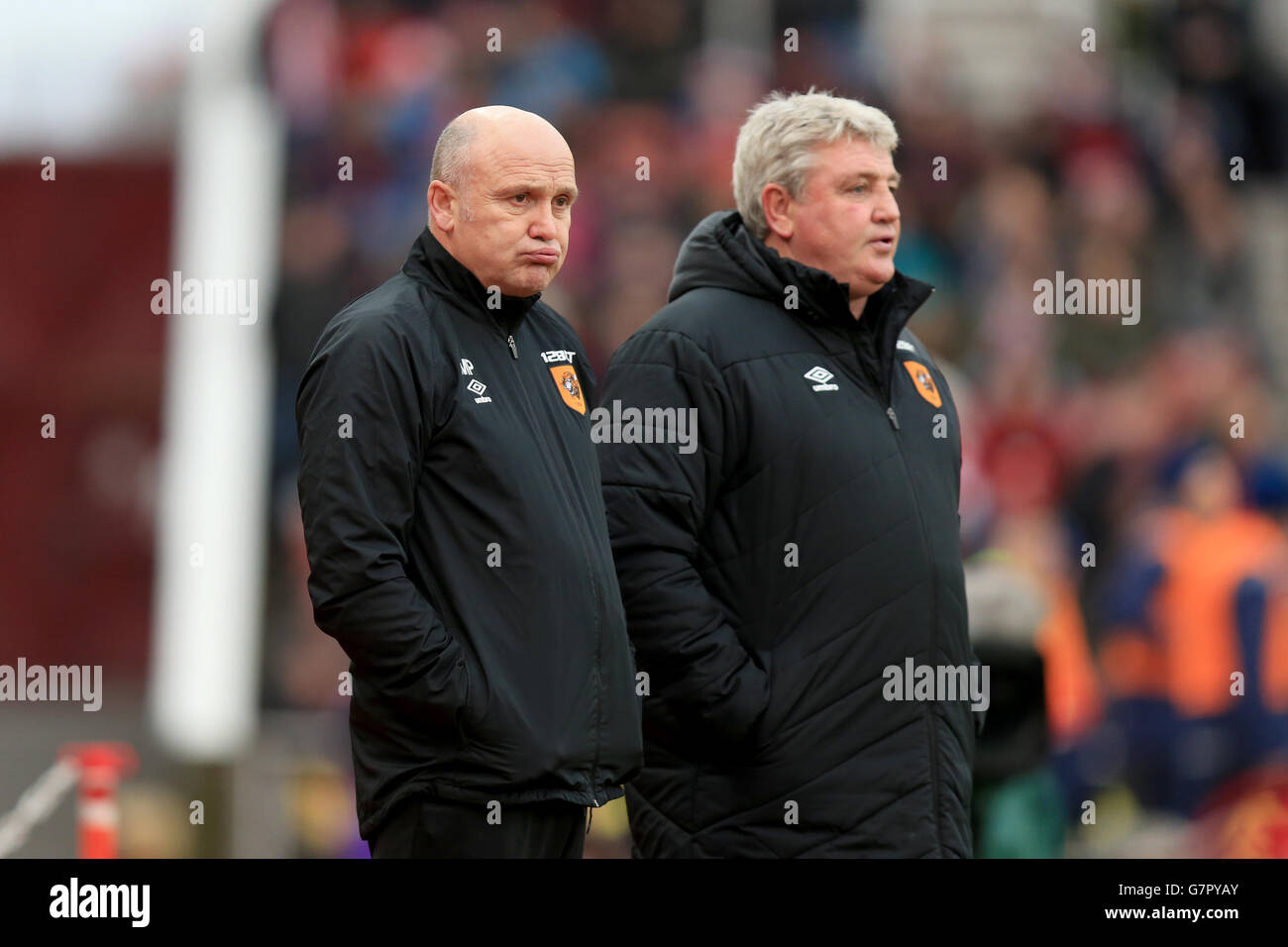 Hull City assistant manager Mike Phelan (left) on the touchline with ...