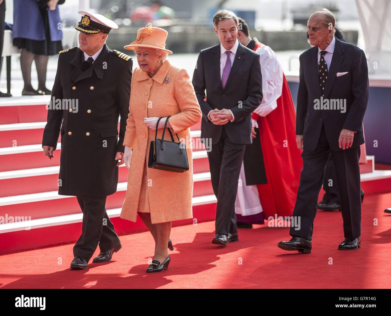Queen Elizabeth II arrives with the Duke of Edinburgh and the ship's ...