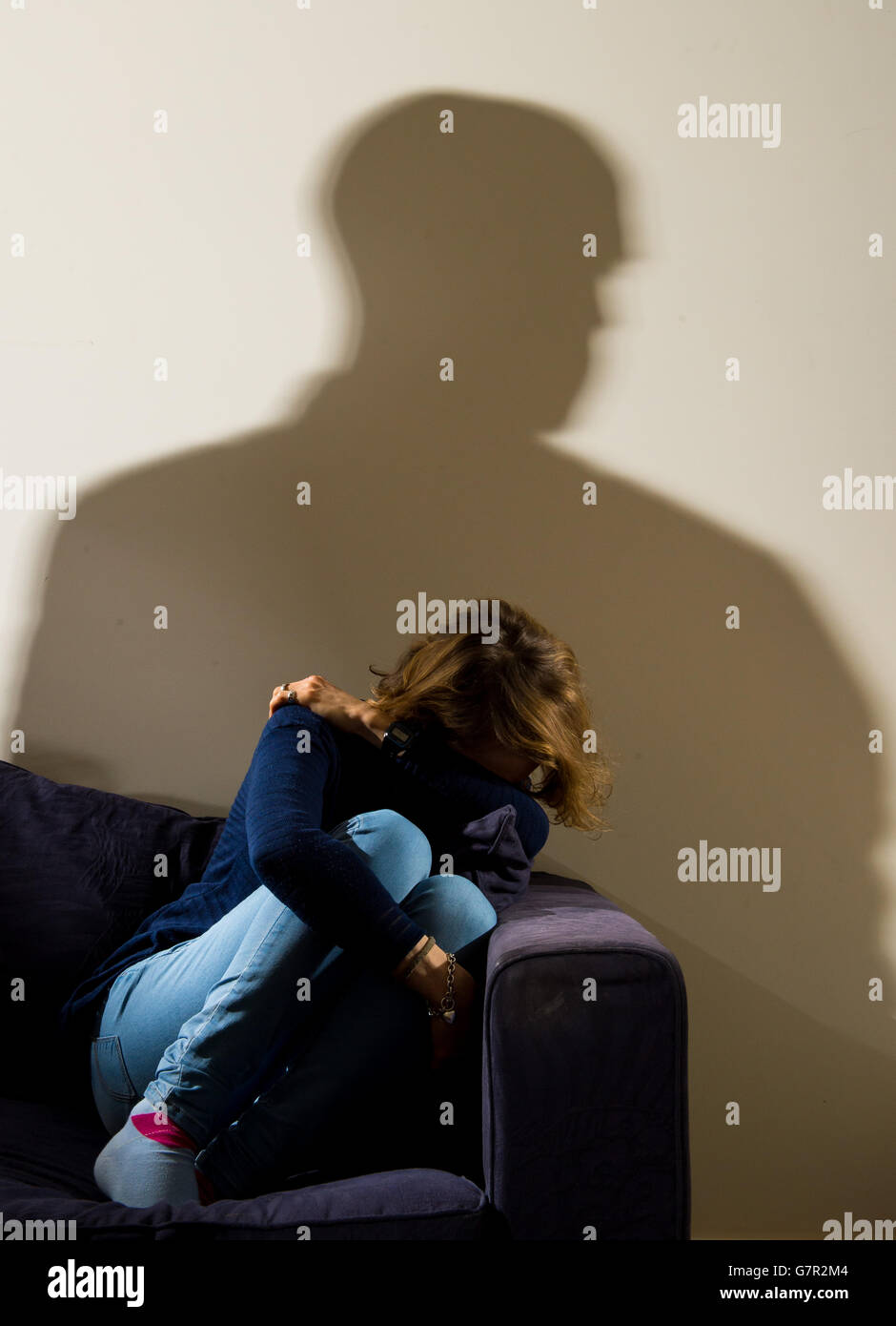 PICTURE POSED BY MODEL A shadow of a man with a clenched fist as a ...