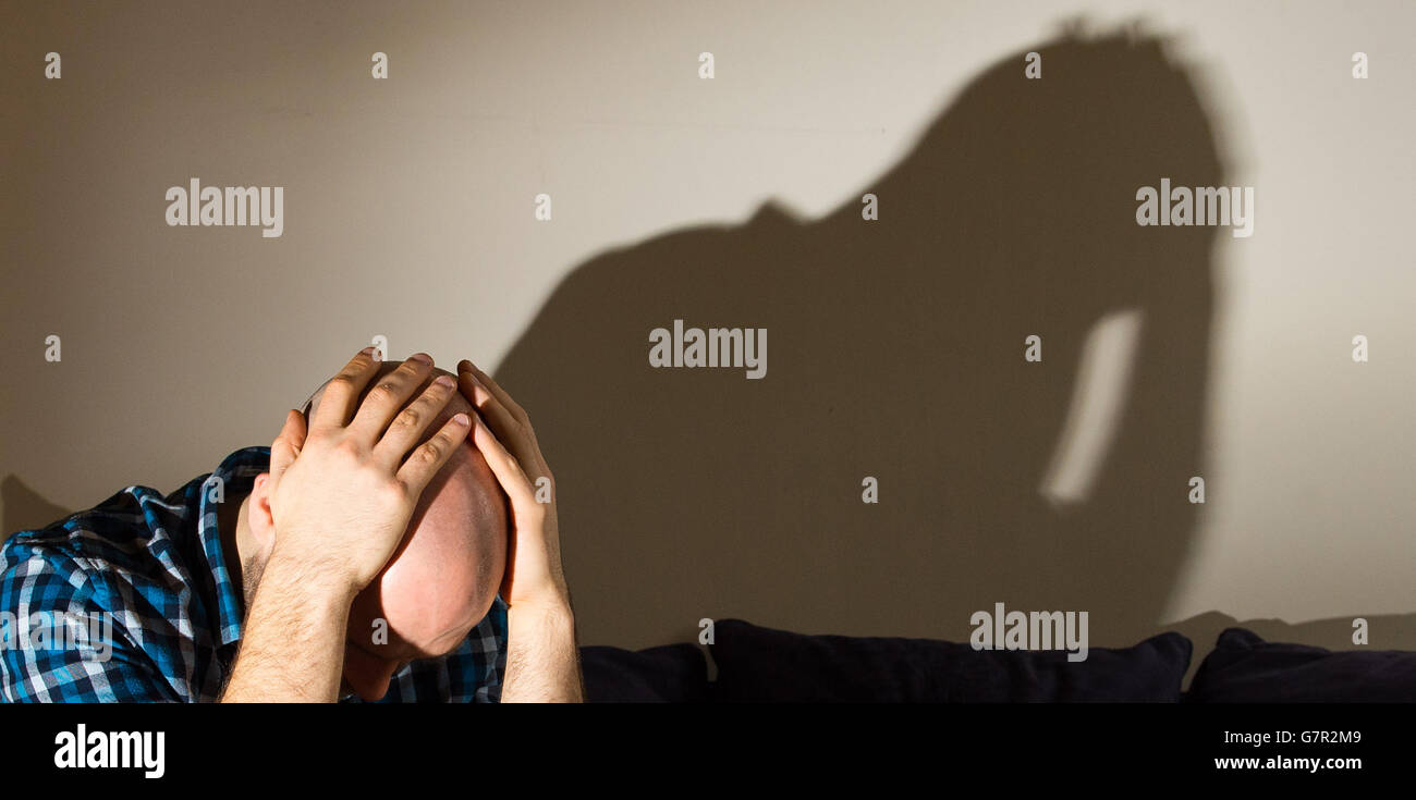 Picture posed by model a man showing signs of depression hi-res stock ...